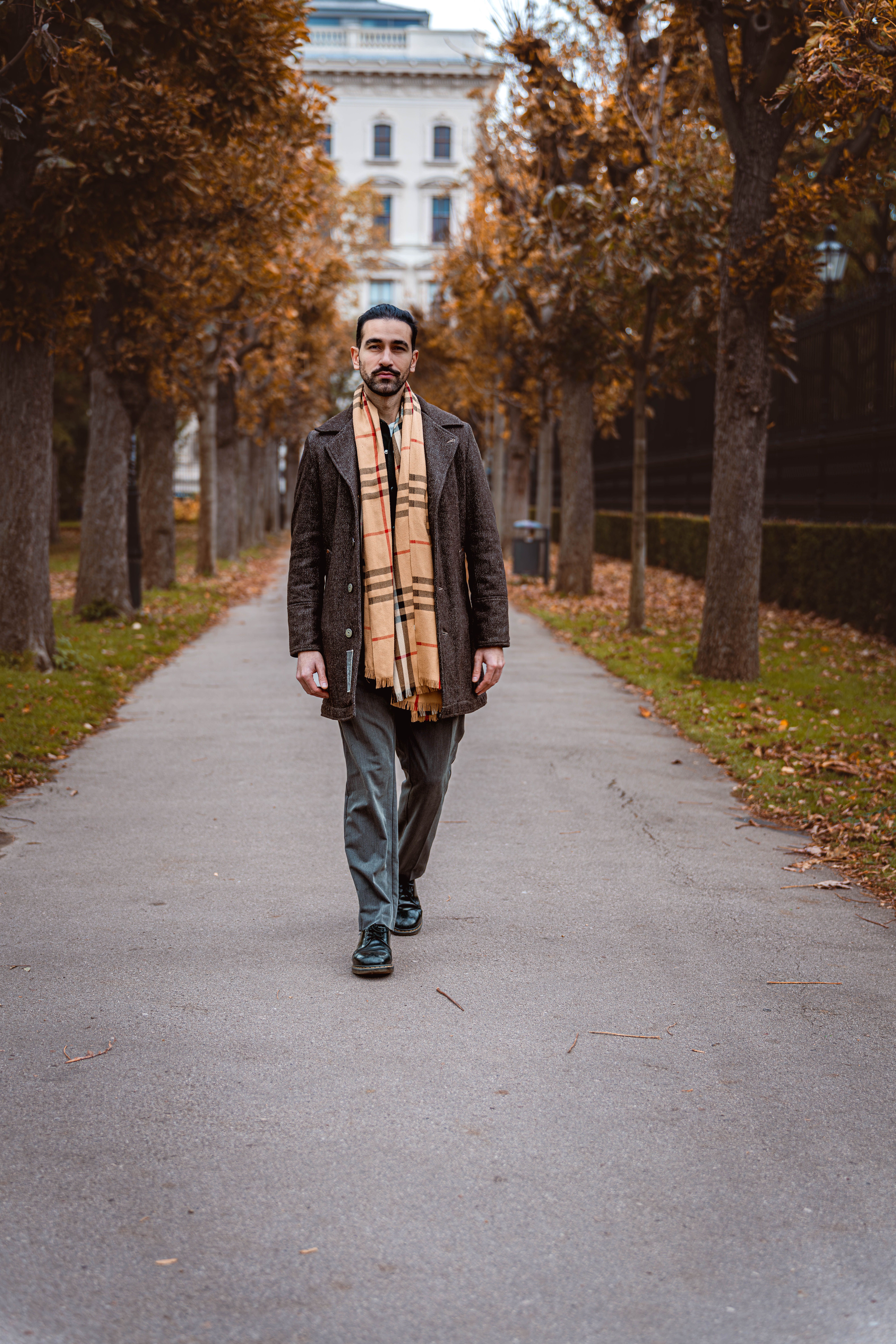 Stylish Male Model Walking in Autumn Vienna Park · Free Stock Photo