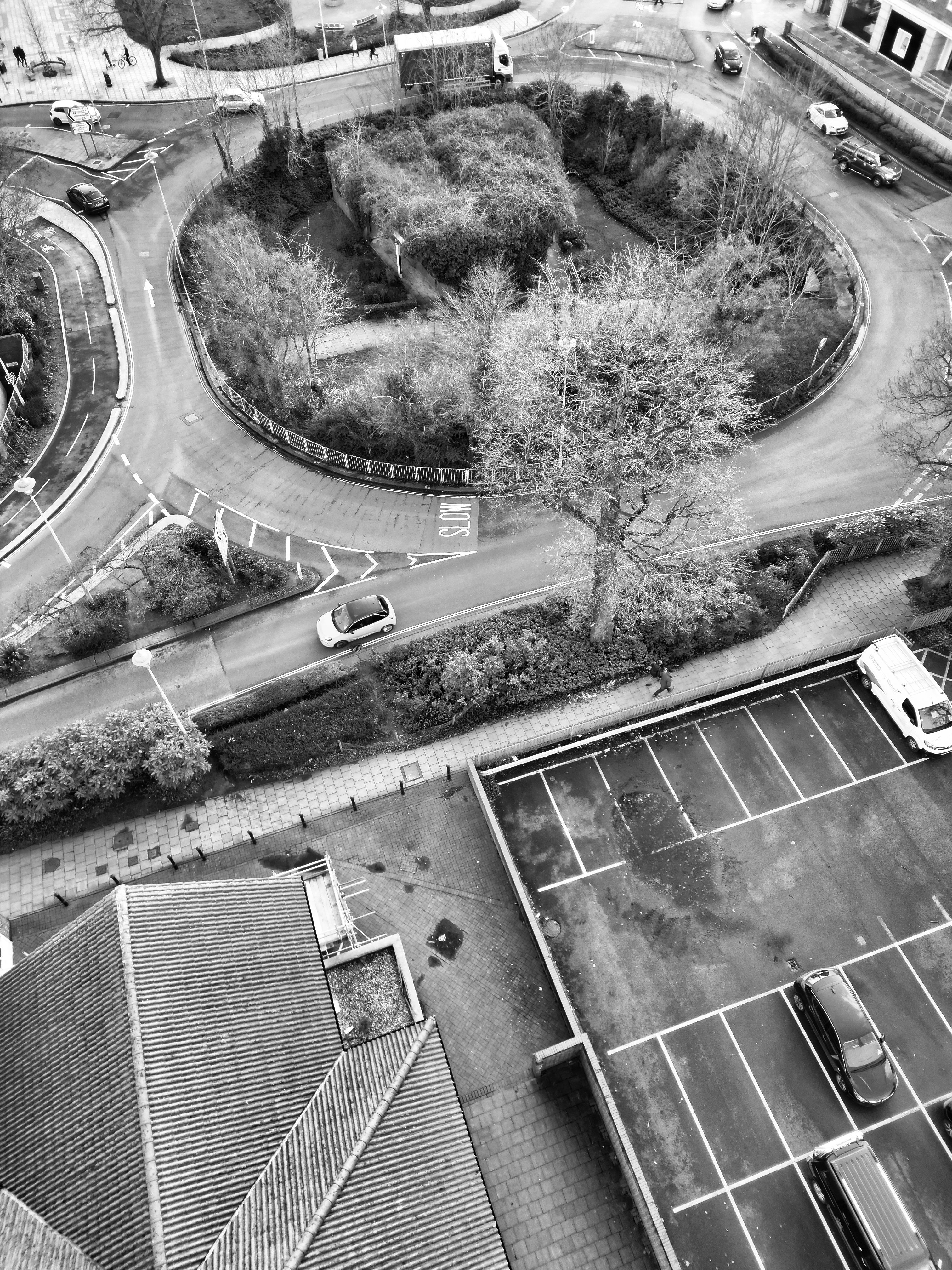 Aerial View of Urban Roundabout in Black and White · Free Stock Photo