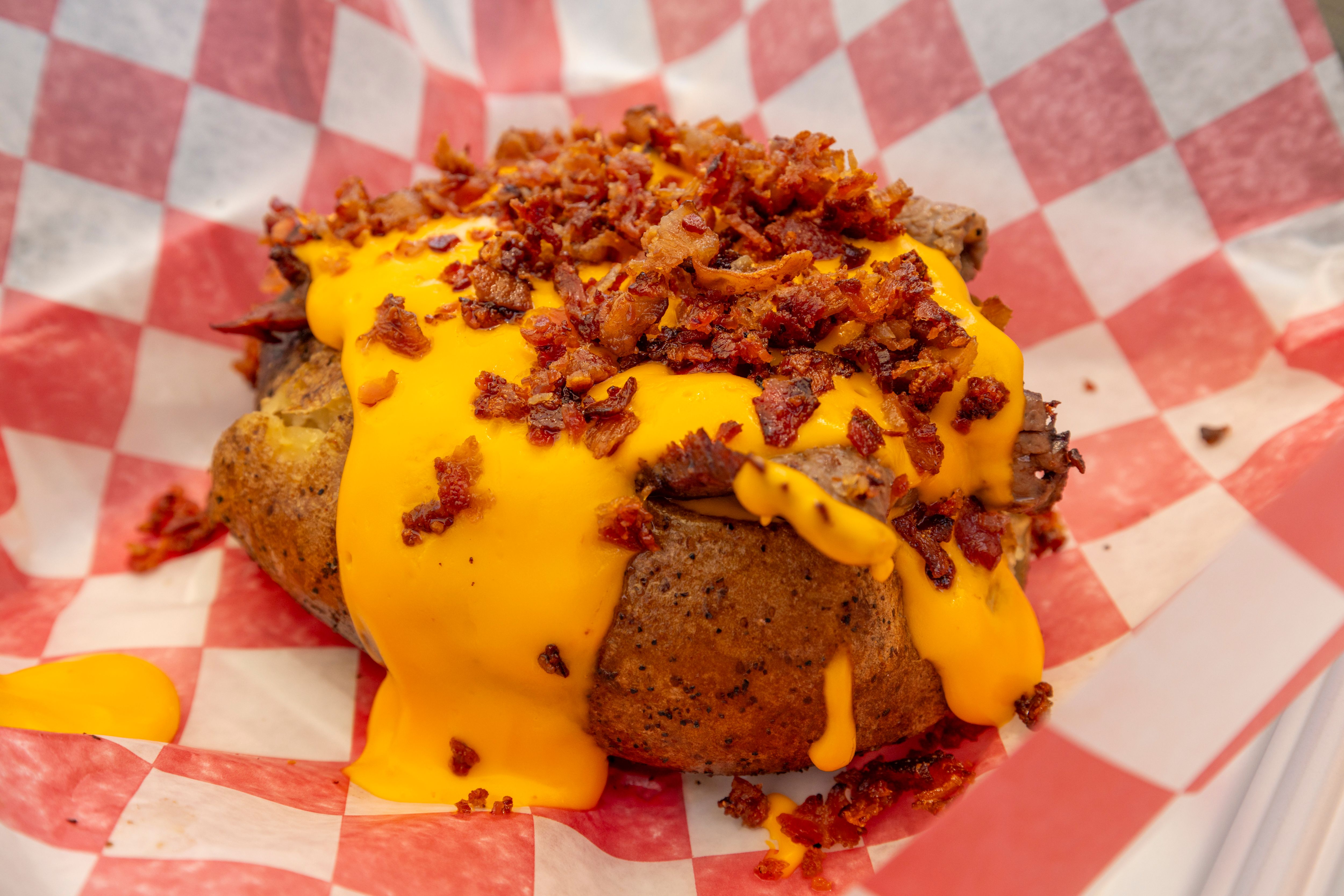 Loaded Baked Potato with Cheddar and Bacon · Free Stock Photo