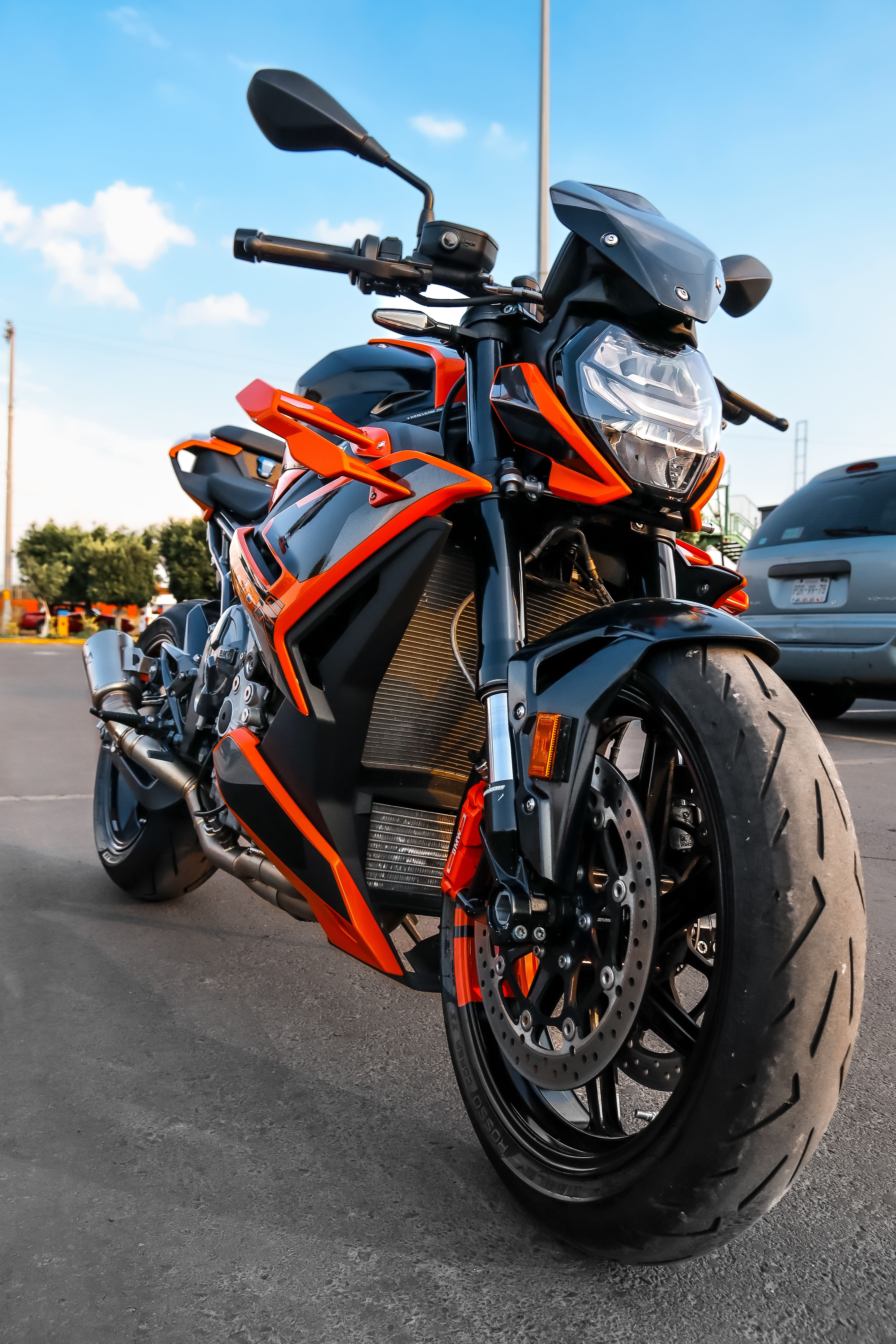 Modern Sport Motorcycle in Outdoor Parking Lot · Free Stock Photo
