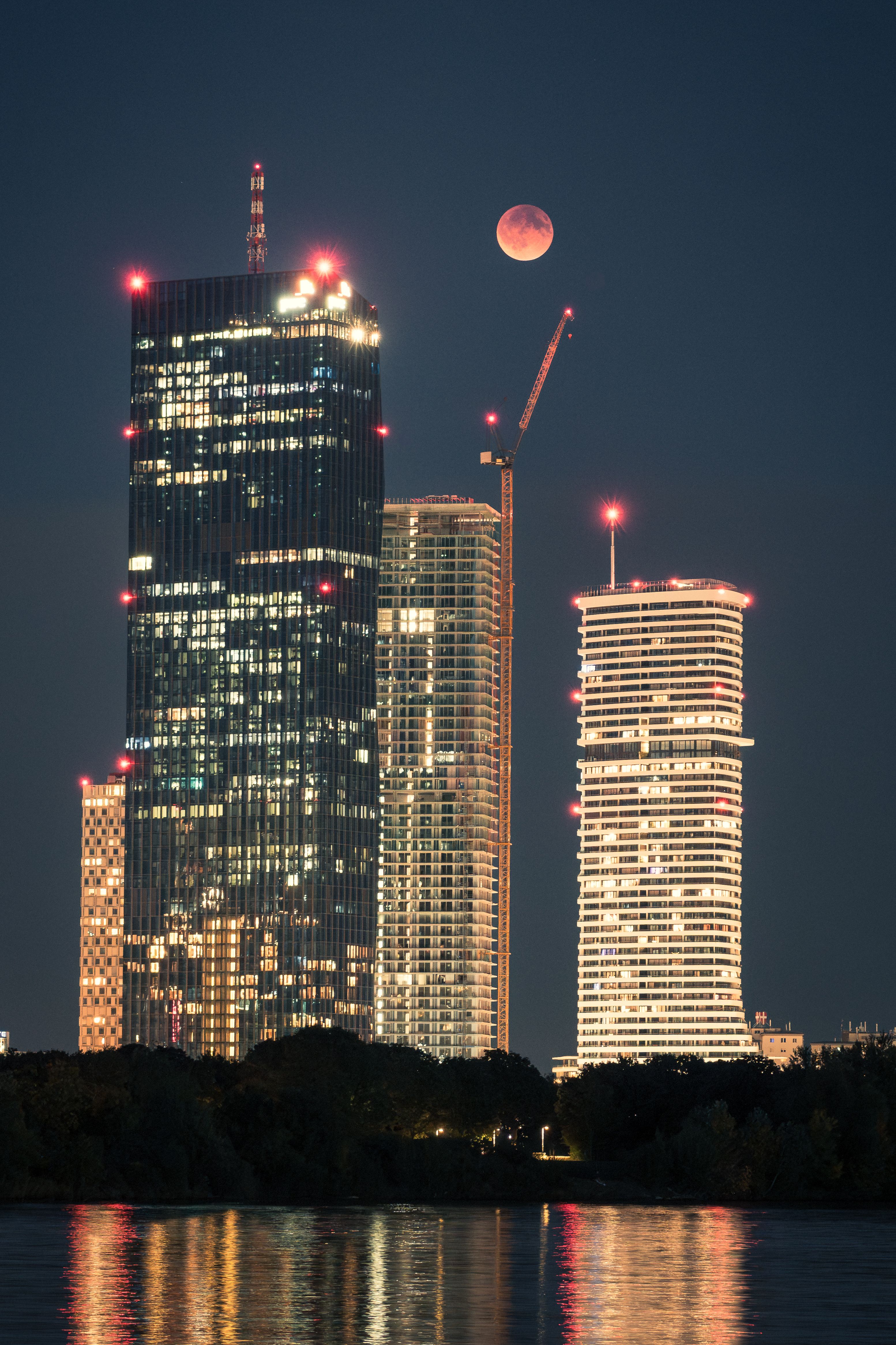Lunar Eclipse Over Vienna Skyline at Night · Free Stock Photo