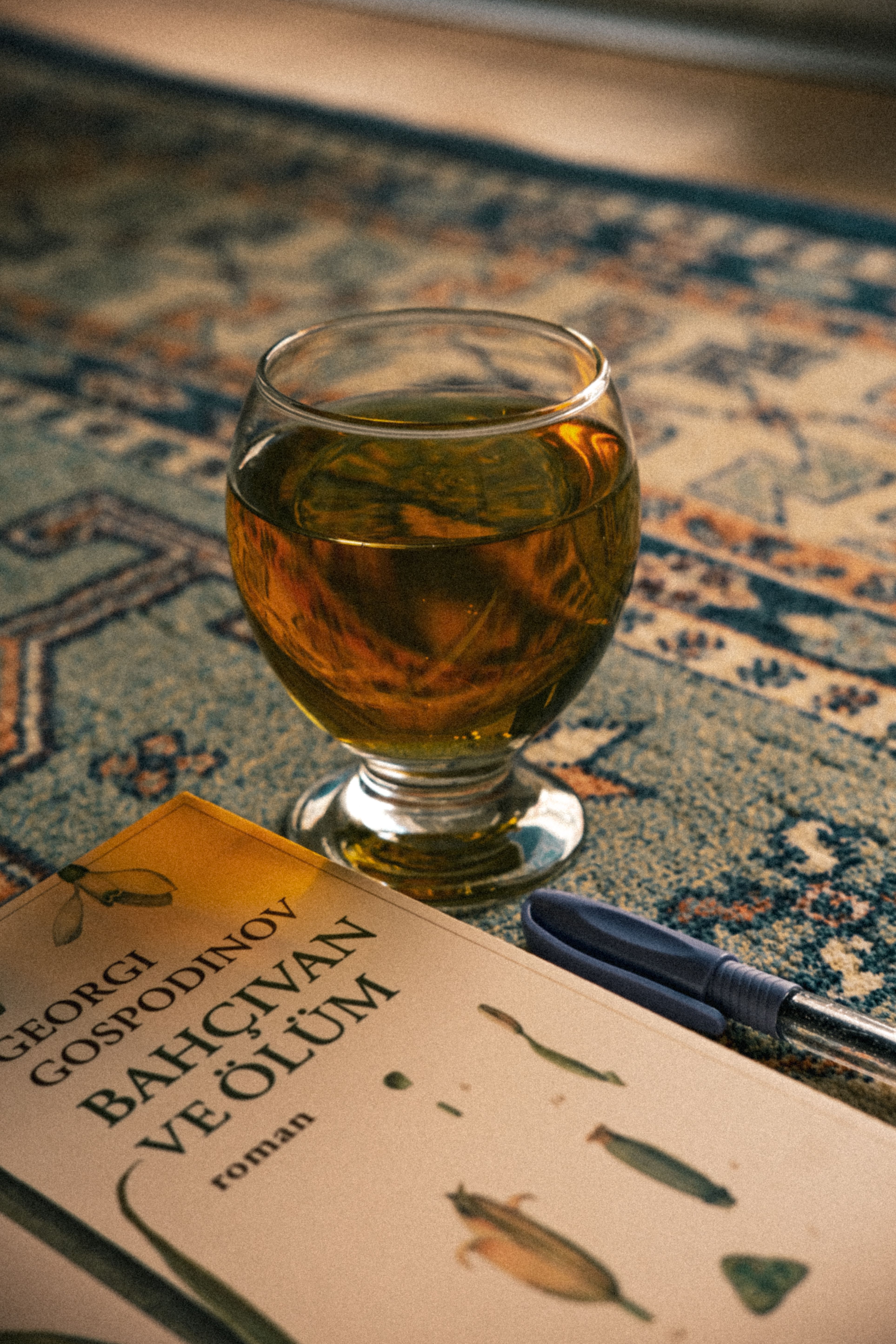 Cozy Reading Scene with Book and Beverage · Free Stock Photo