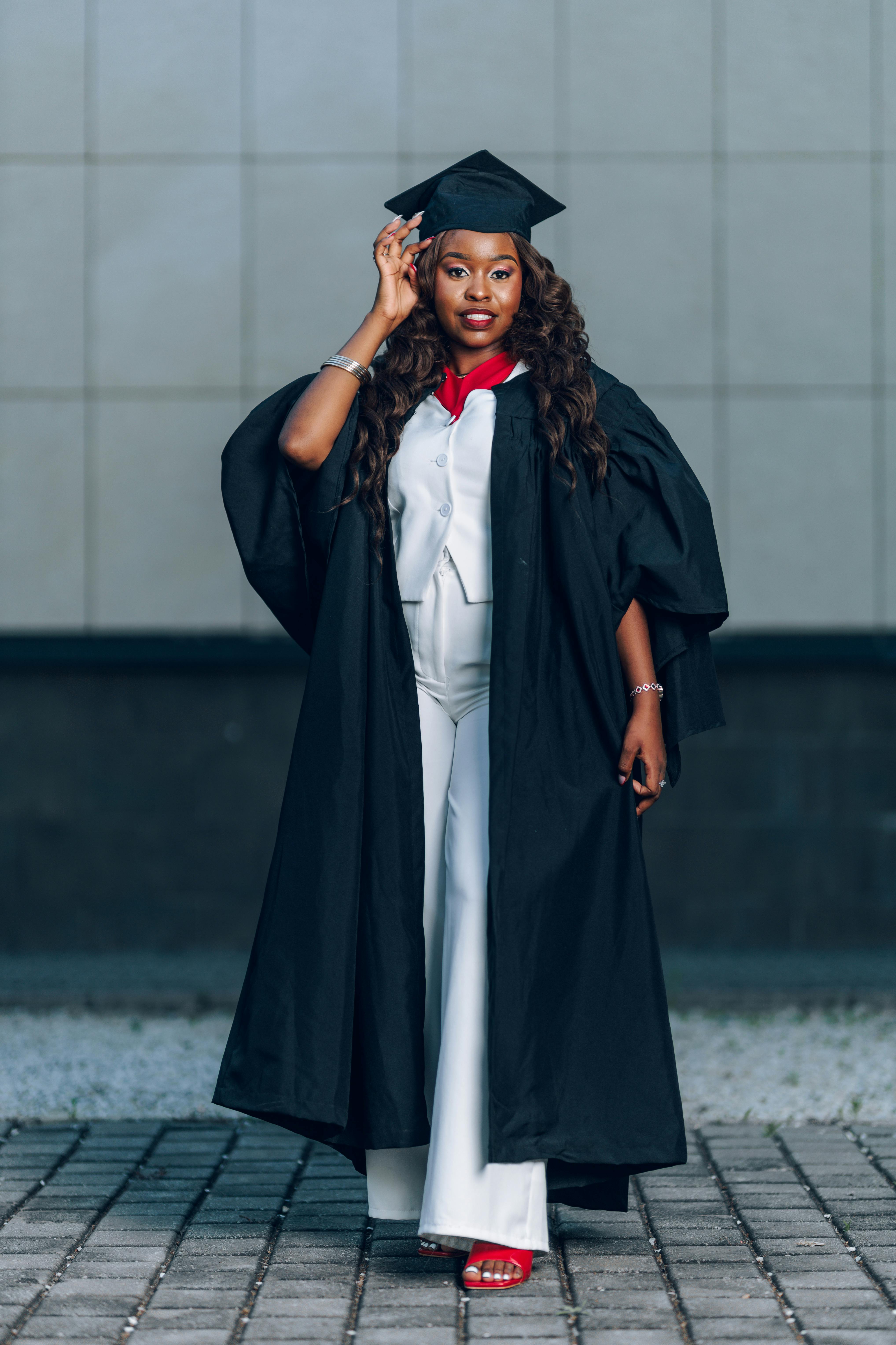 Graduation Celebration with Cap and Gown · Free Stock Photo