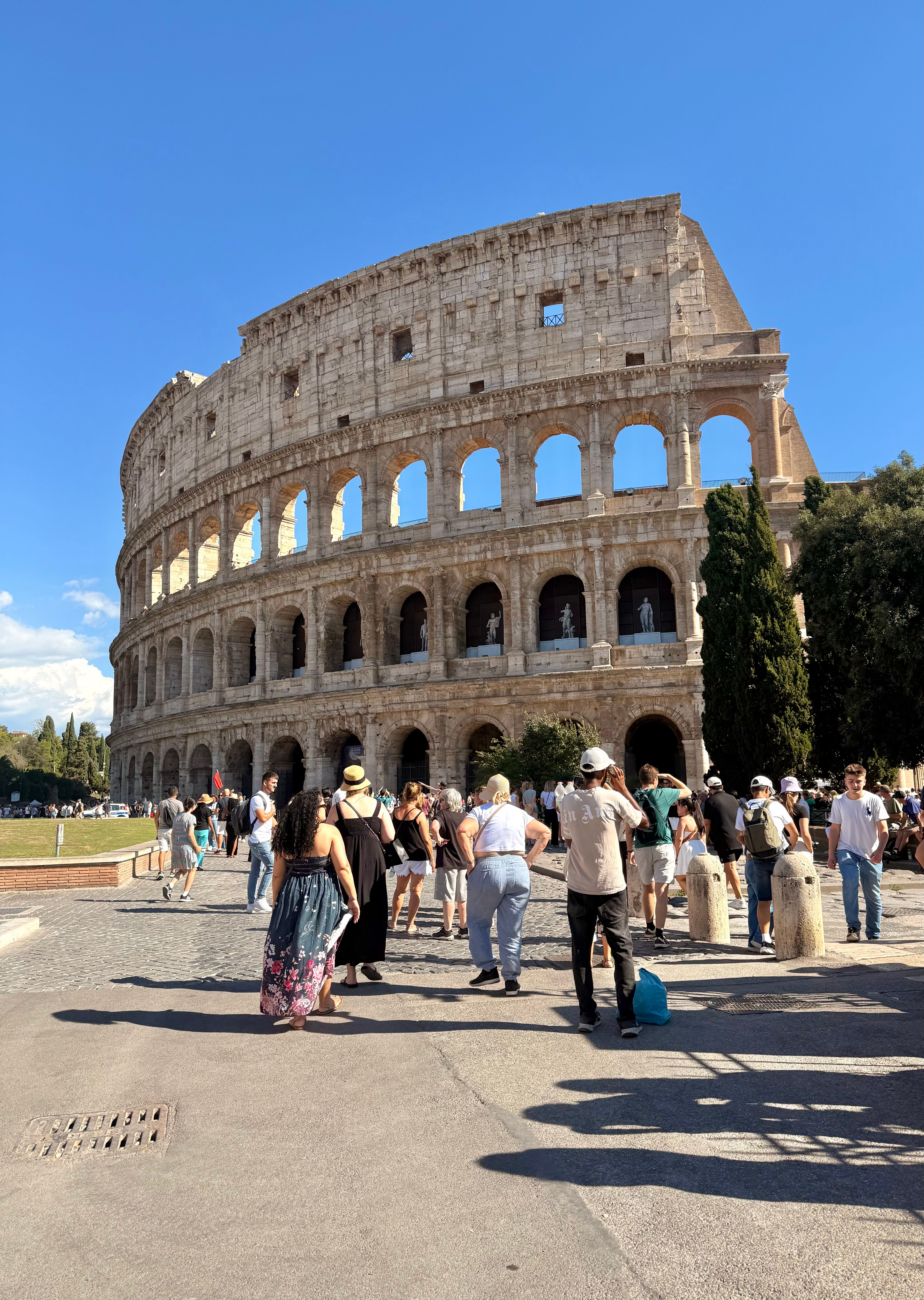Exploring the Colosseum on a Sunny Day · Free Stock Photo