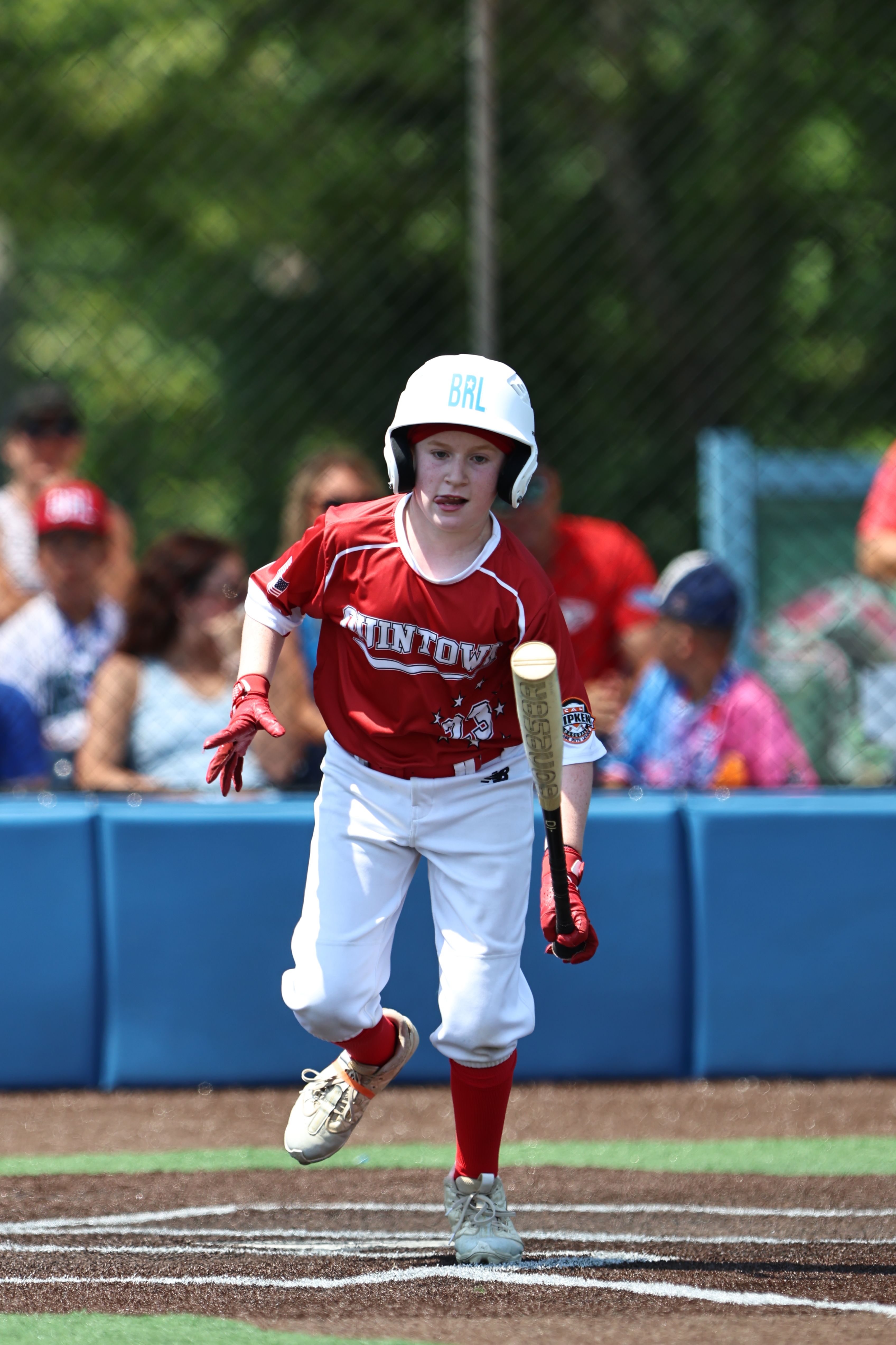 Youth Baseball Player Running Base During Game · Free Stock Photo