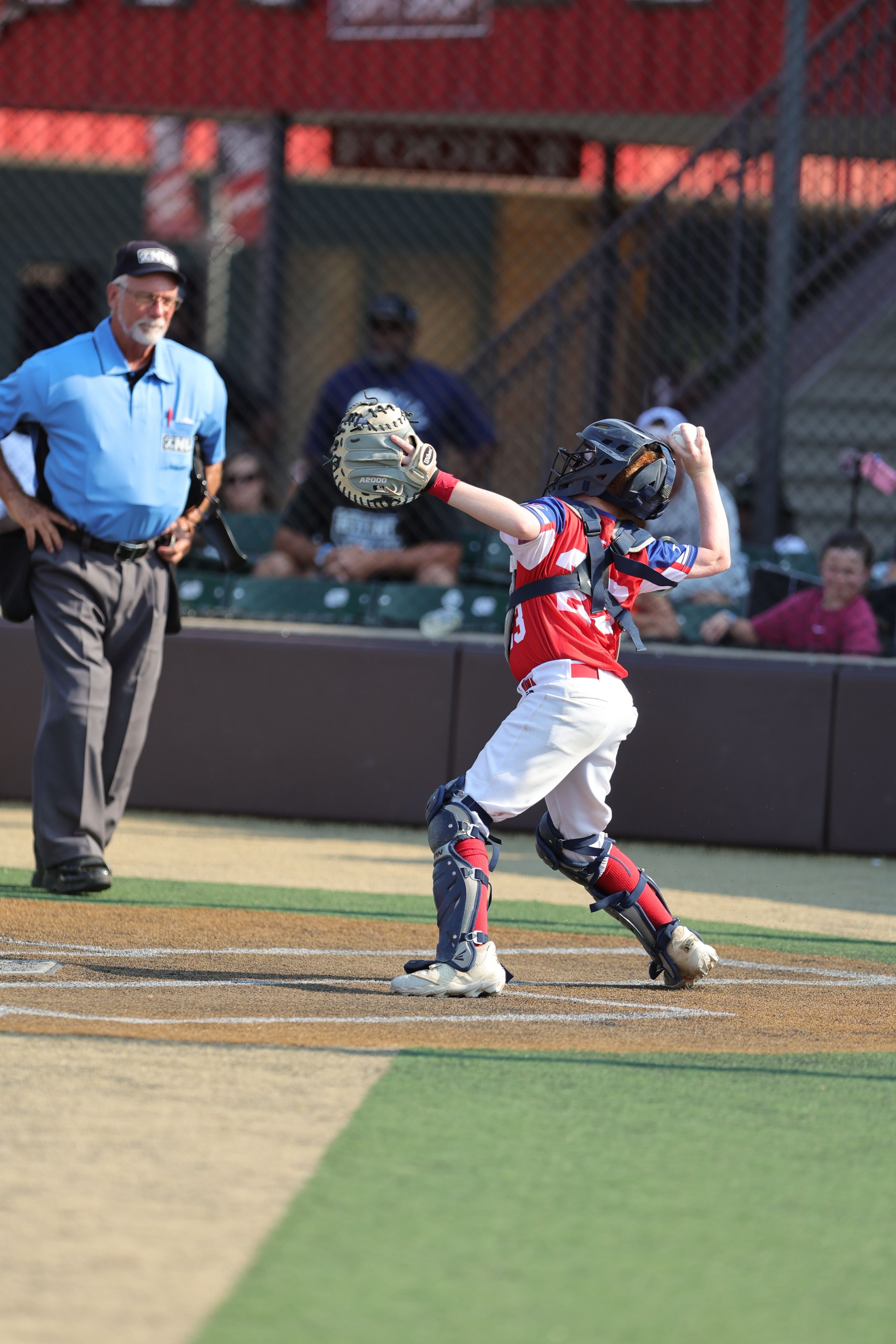 Youth Baseball Catcher in Action at Game · Free Stock Photo
