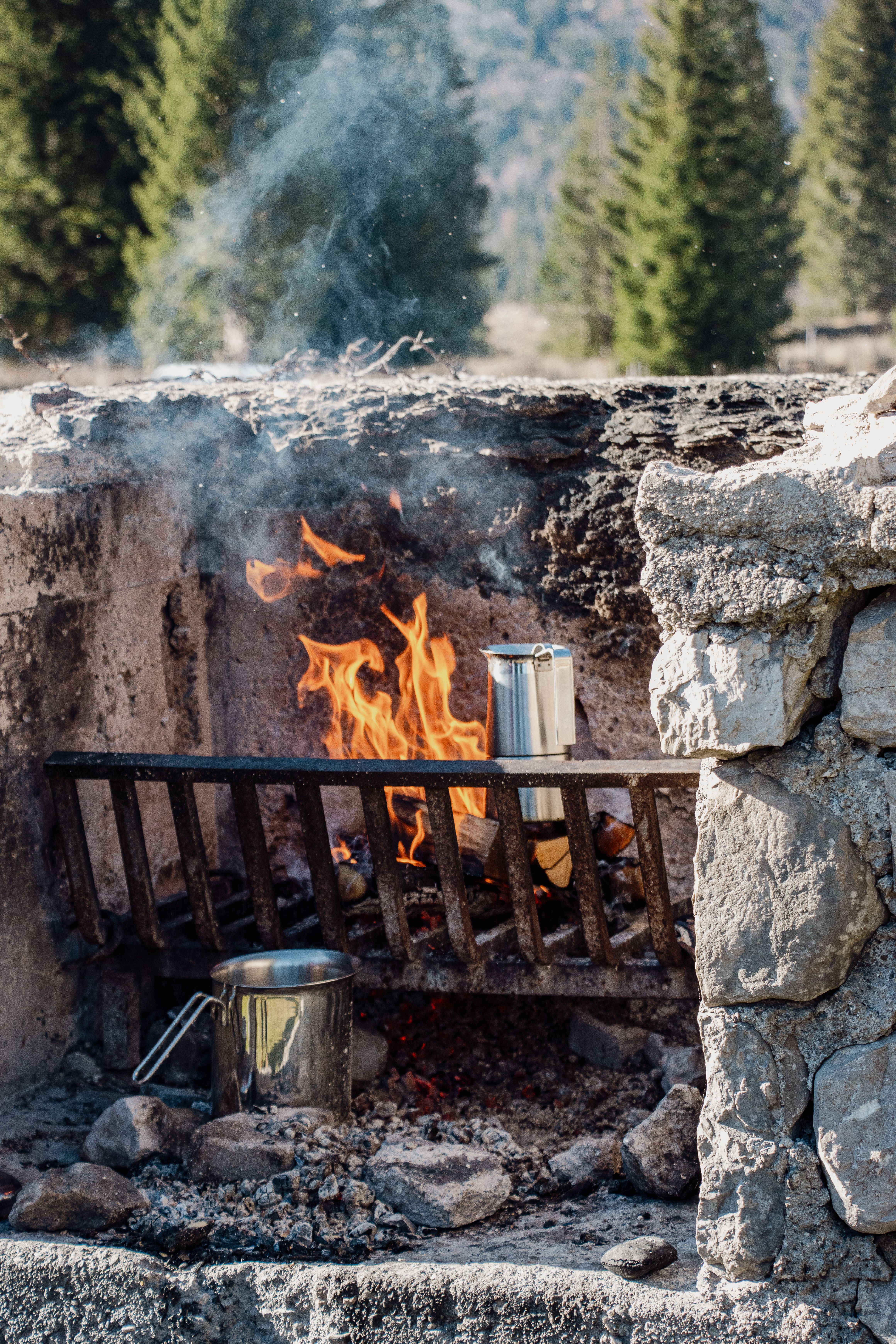 Outdoor Campfire Cooking with Metal Pots · Free Stock Photo