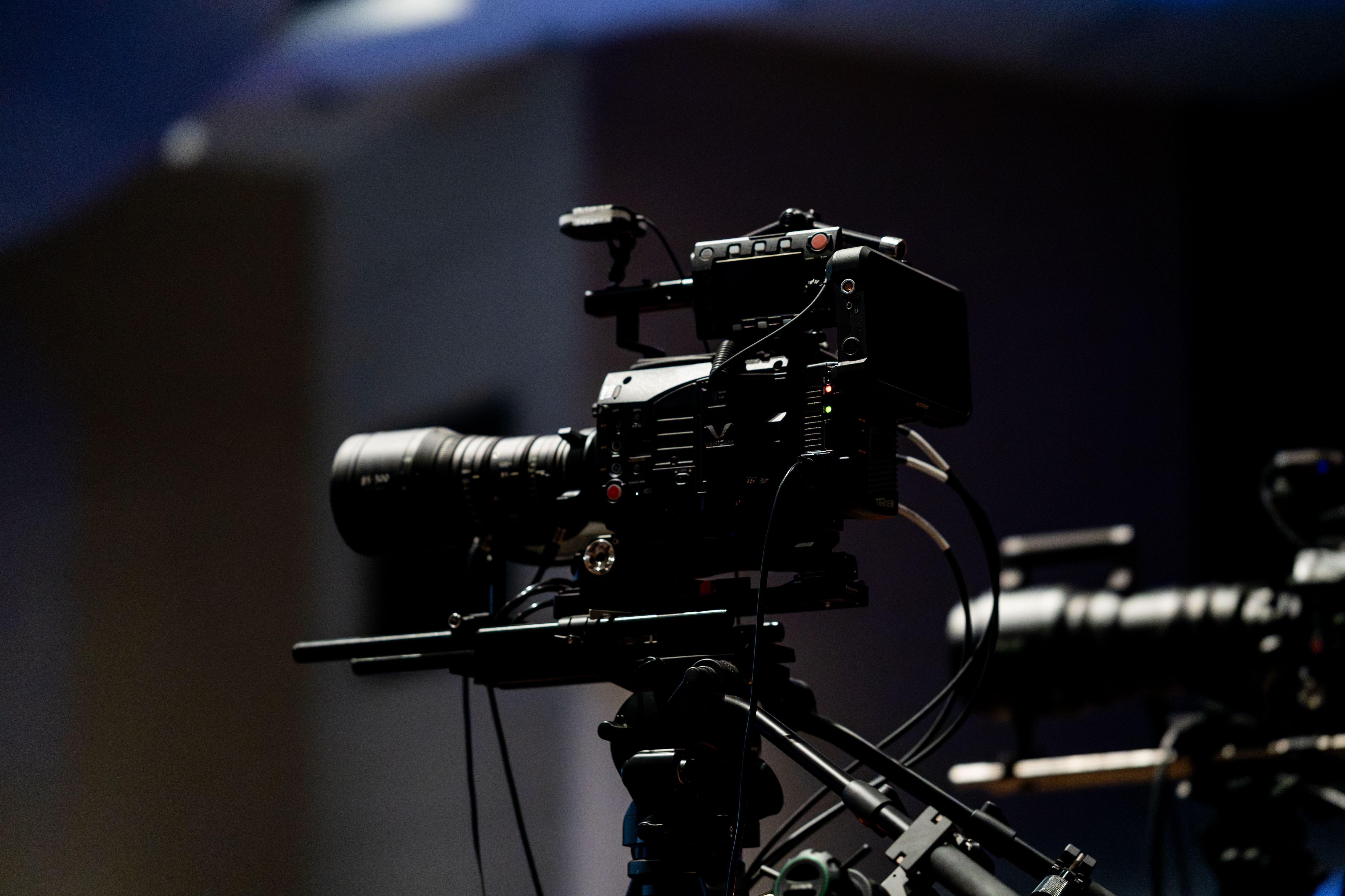 Woman Standing in Front of Video Camera · Free Stock Photo