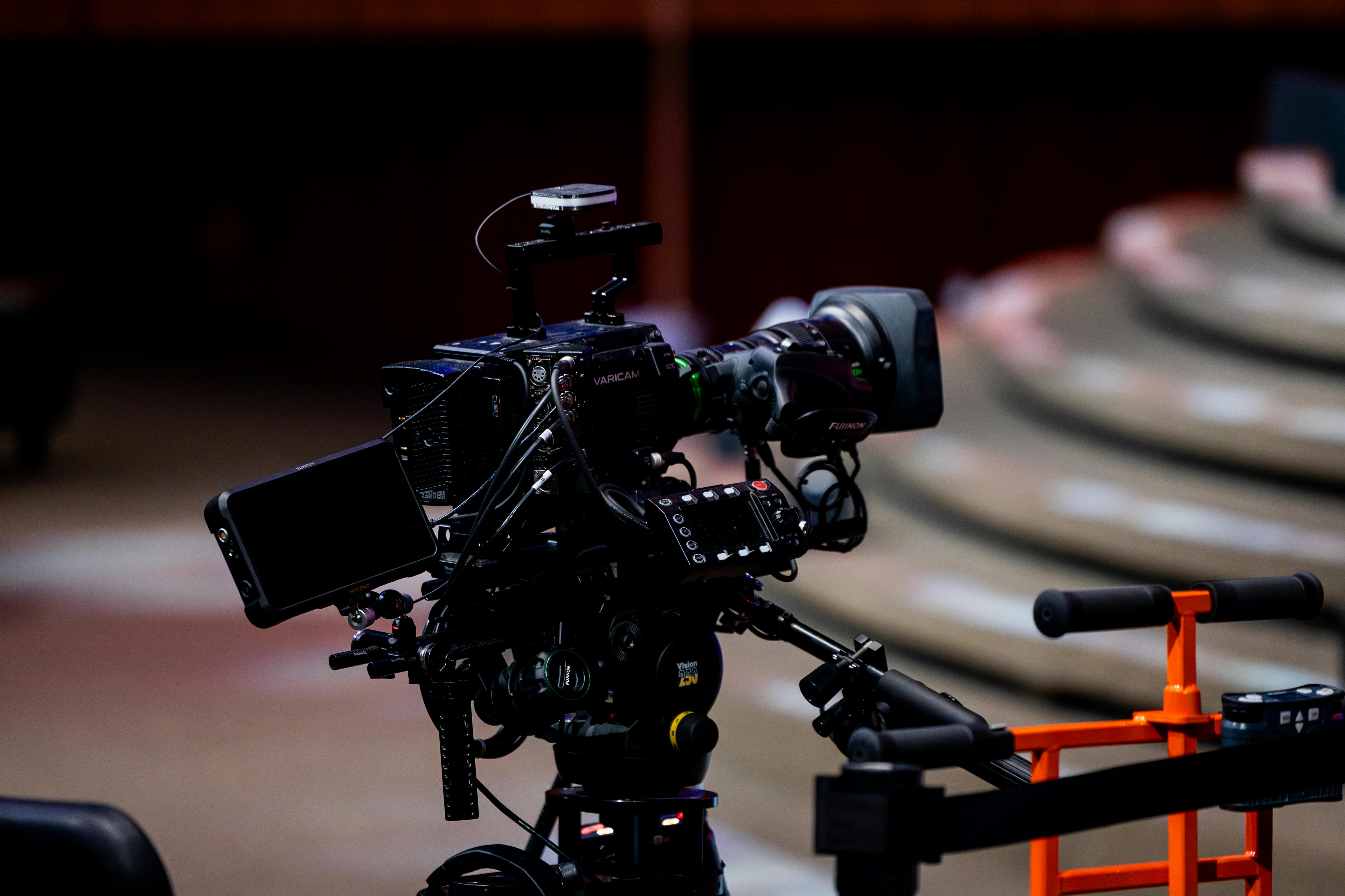 Professional Video Camera Setup in Auditorium · Free Stock Photo