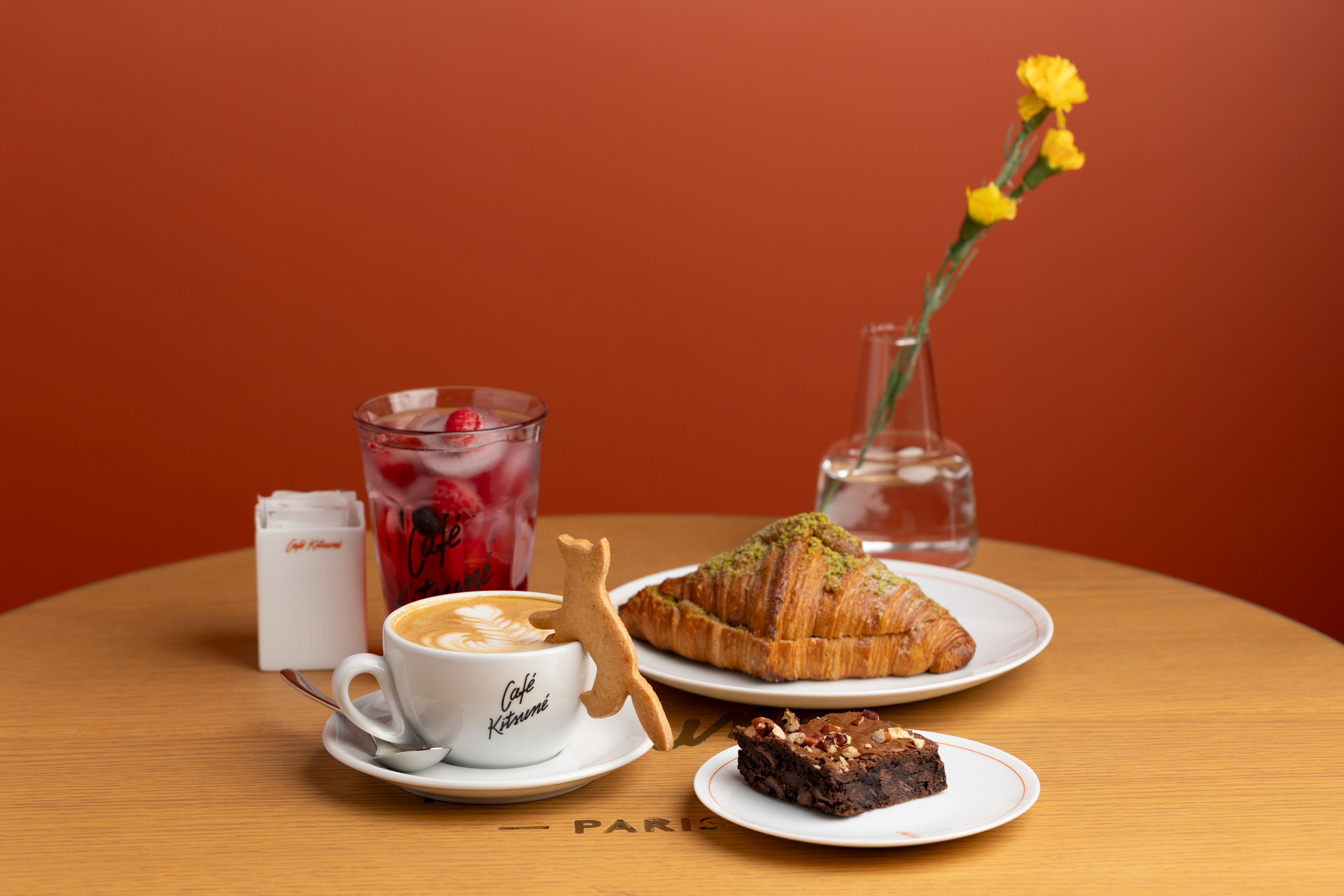 Elegant Café Breakfast with Croissant and Coffee · Free Stock Photo