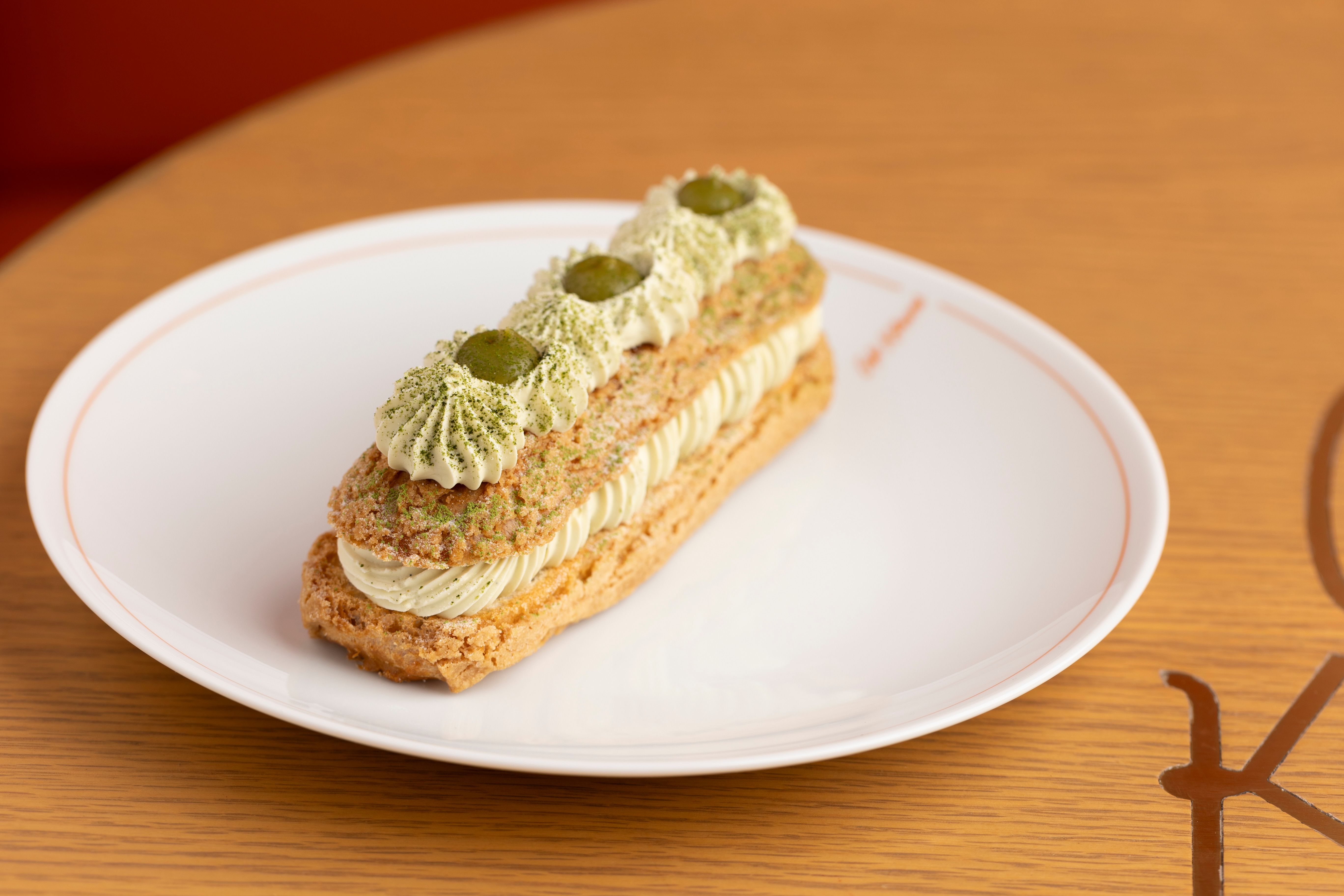 Matcha Cream Eclair on Elegant Plate · Free Stock Photo