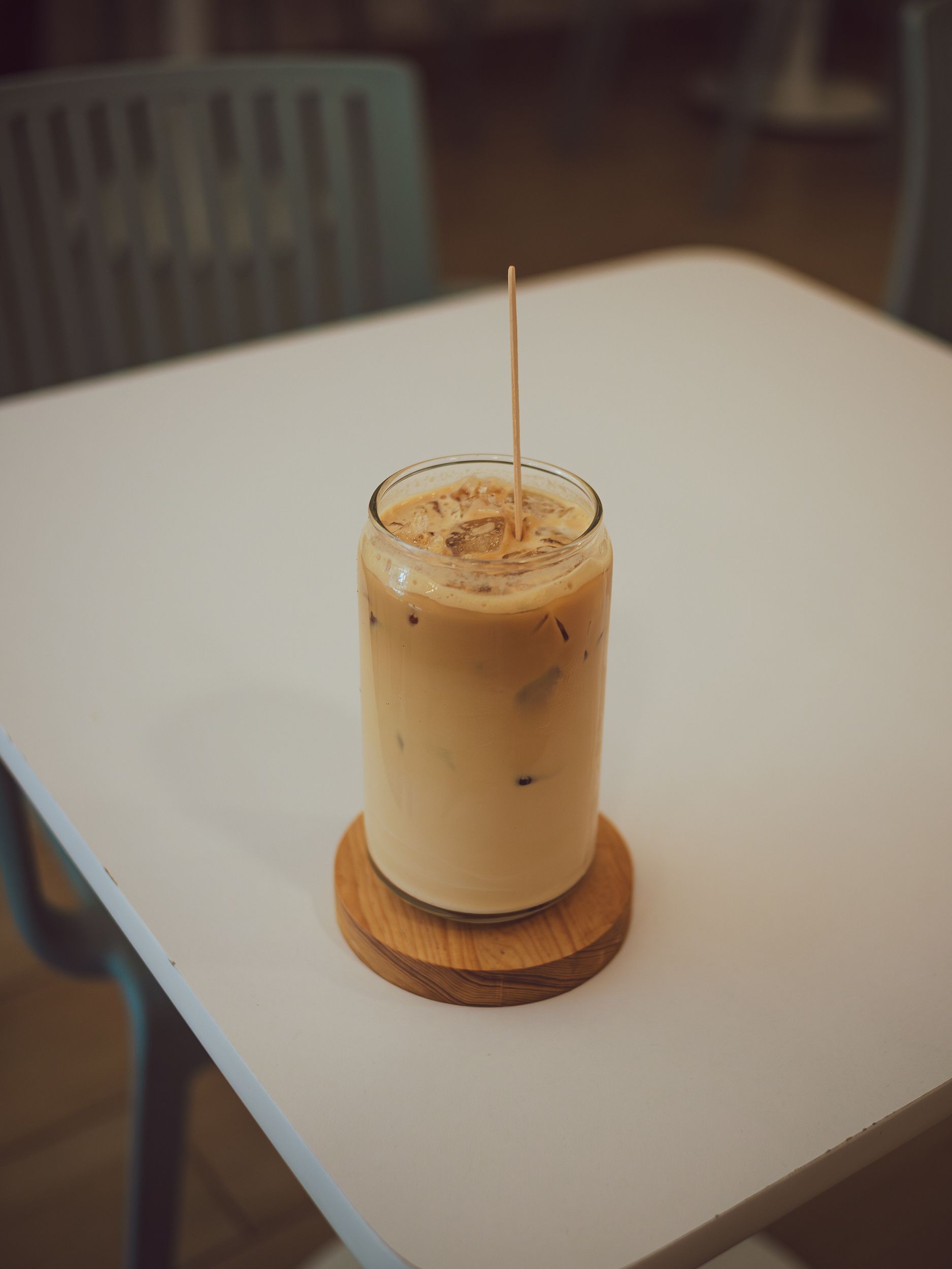 Chilled Iced Coffee in a Modern Cafe Setting · Free Stock Photo