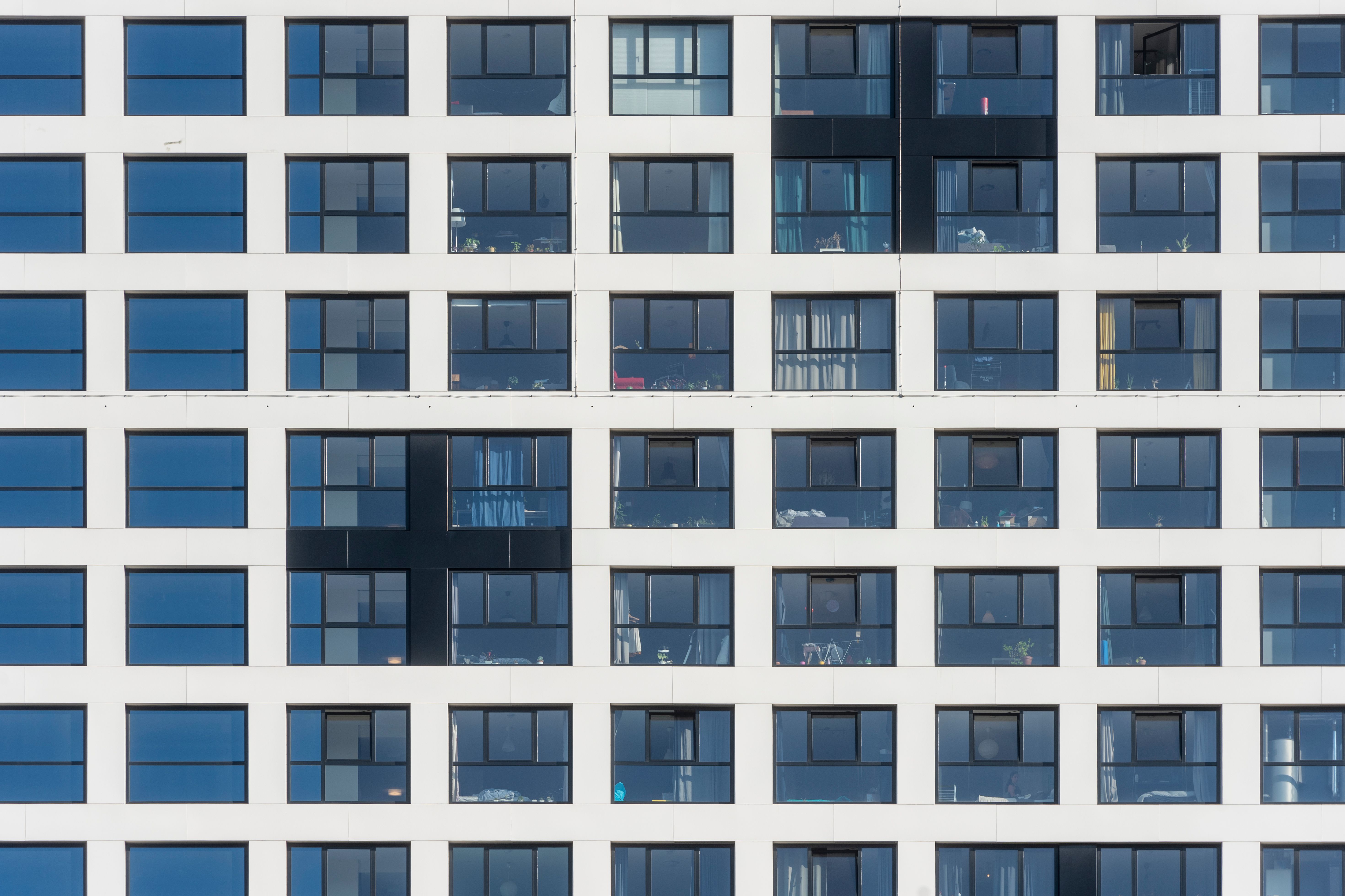 Modern Building Facade with Grid Windows · Free Stock Photo