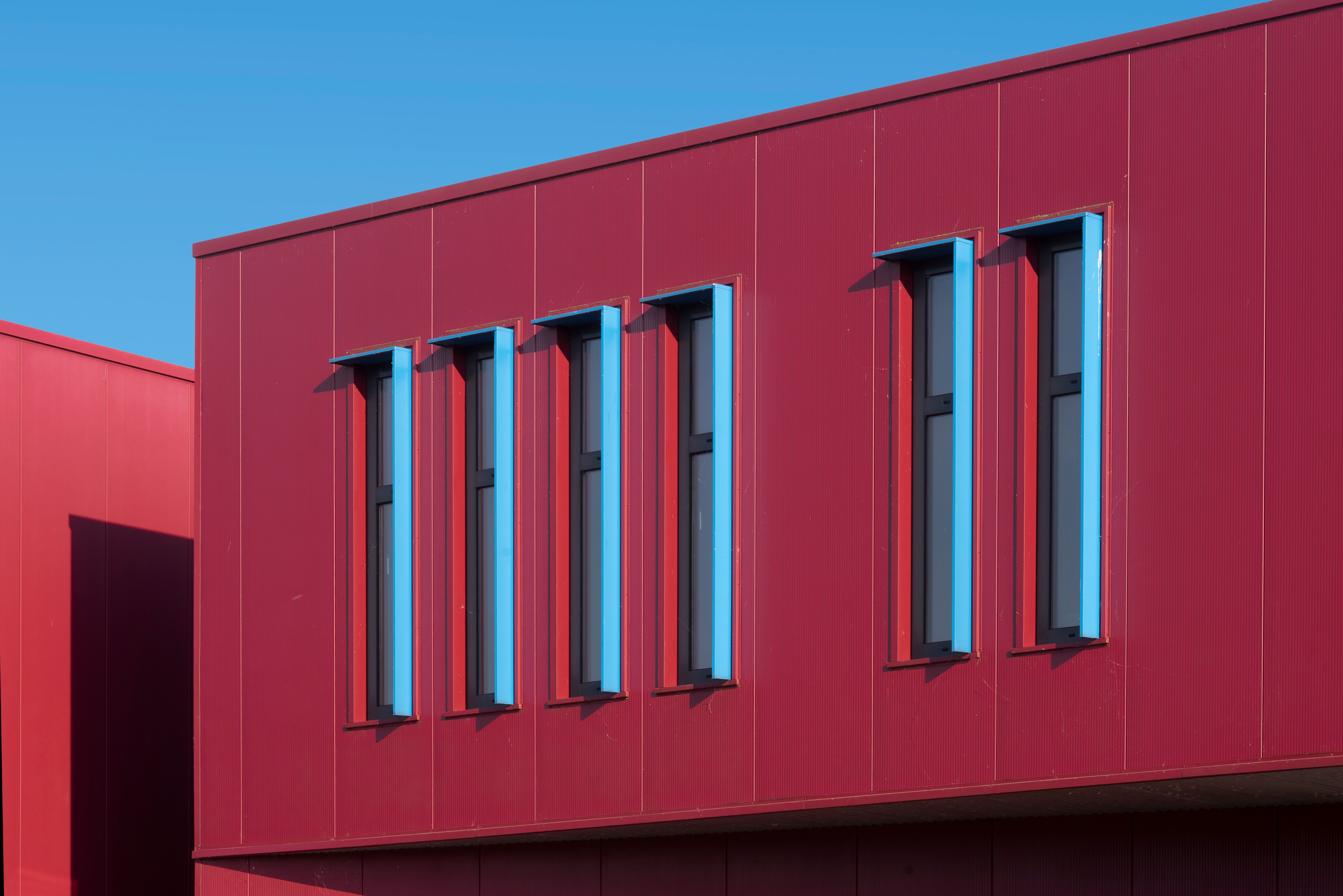 Modern Red Facade Building Exterior Design · Free Stock Photo