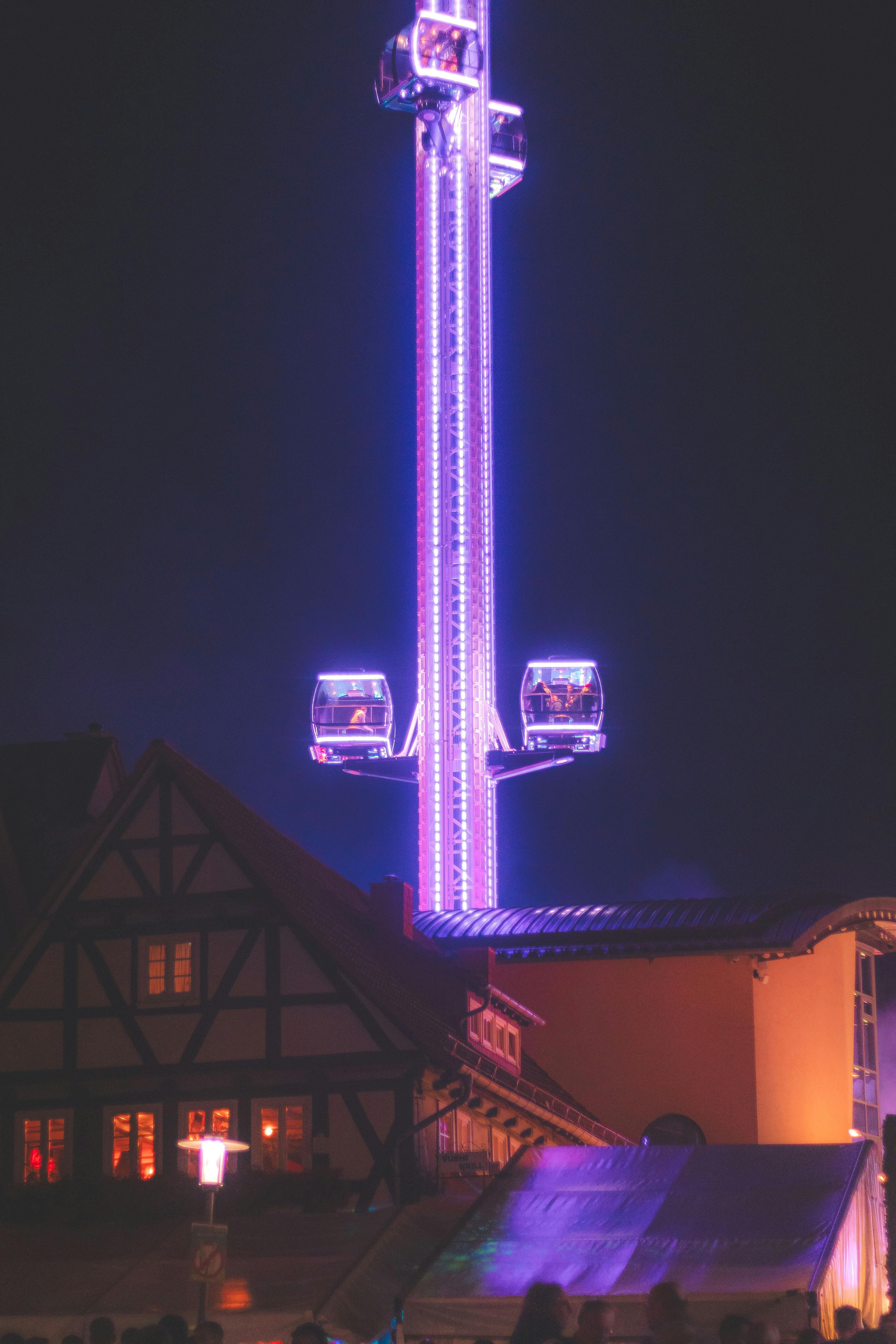 Illuminated Night Shot of Amusement Park Ride · Free Stock Photo
