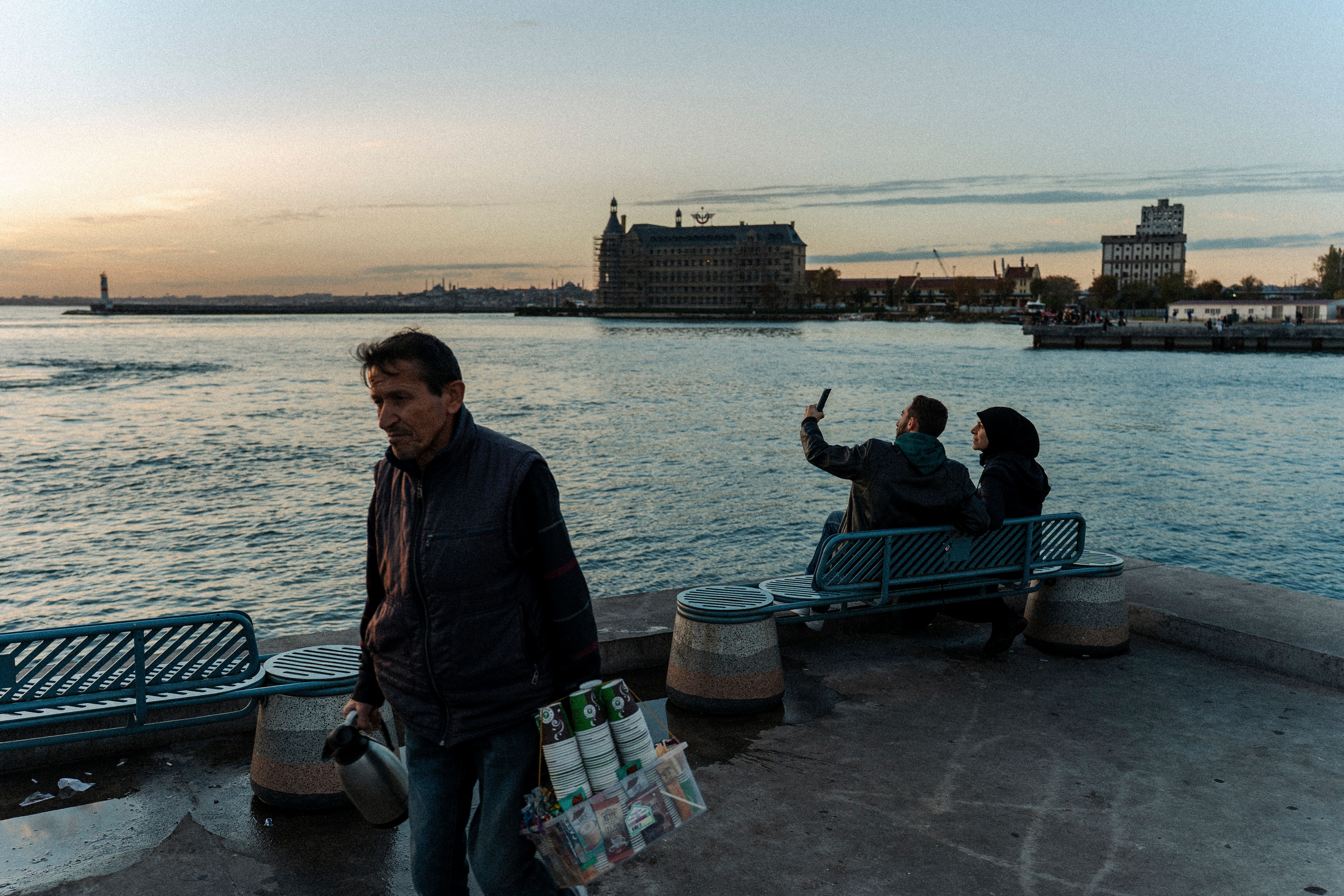 Couple Taking Selfie by Scenic Waterfront at Dusk · Free Stock Photo