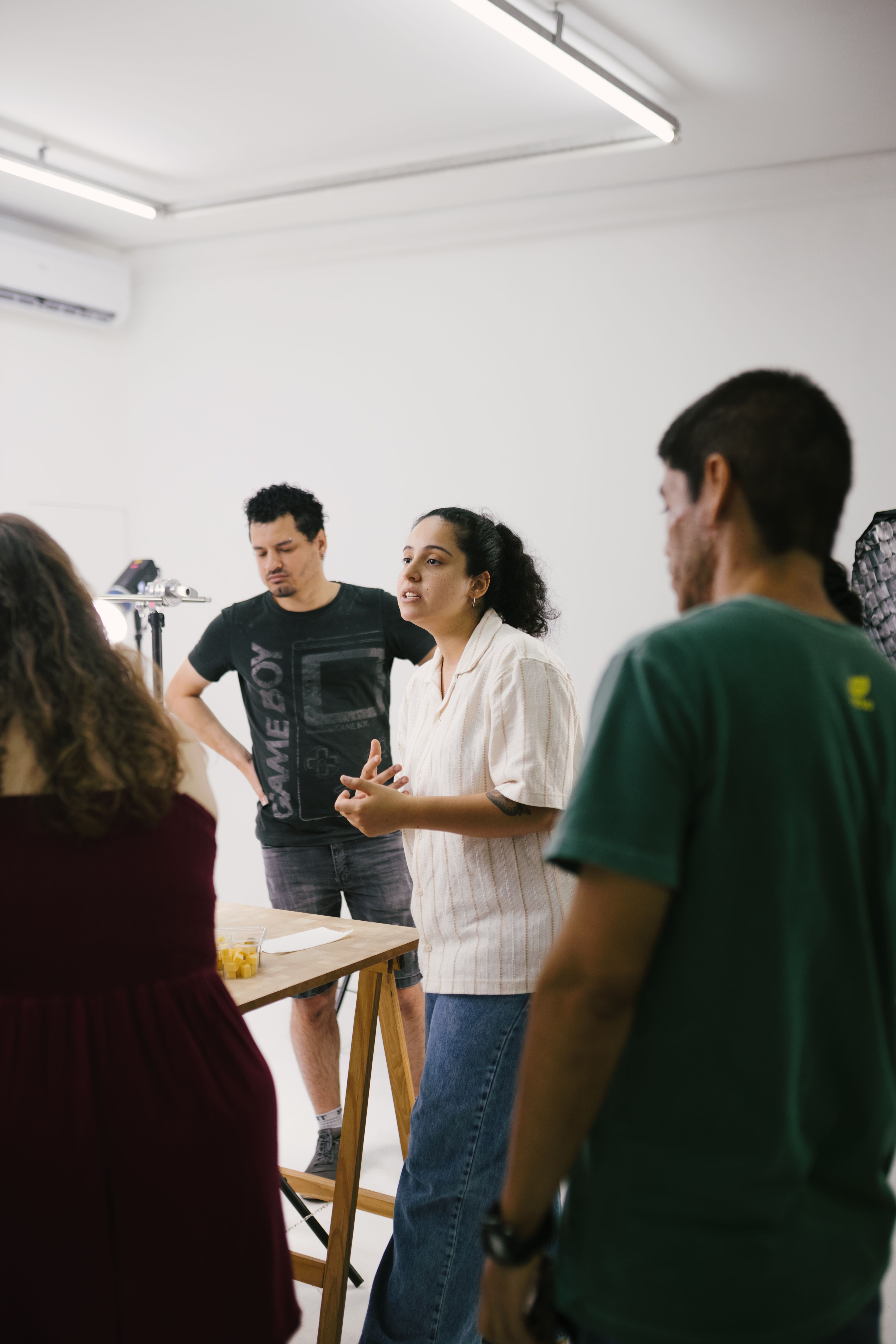 Group Discussion in a Creative Studio Setting · Free Stock Photo