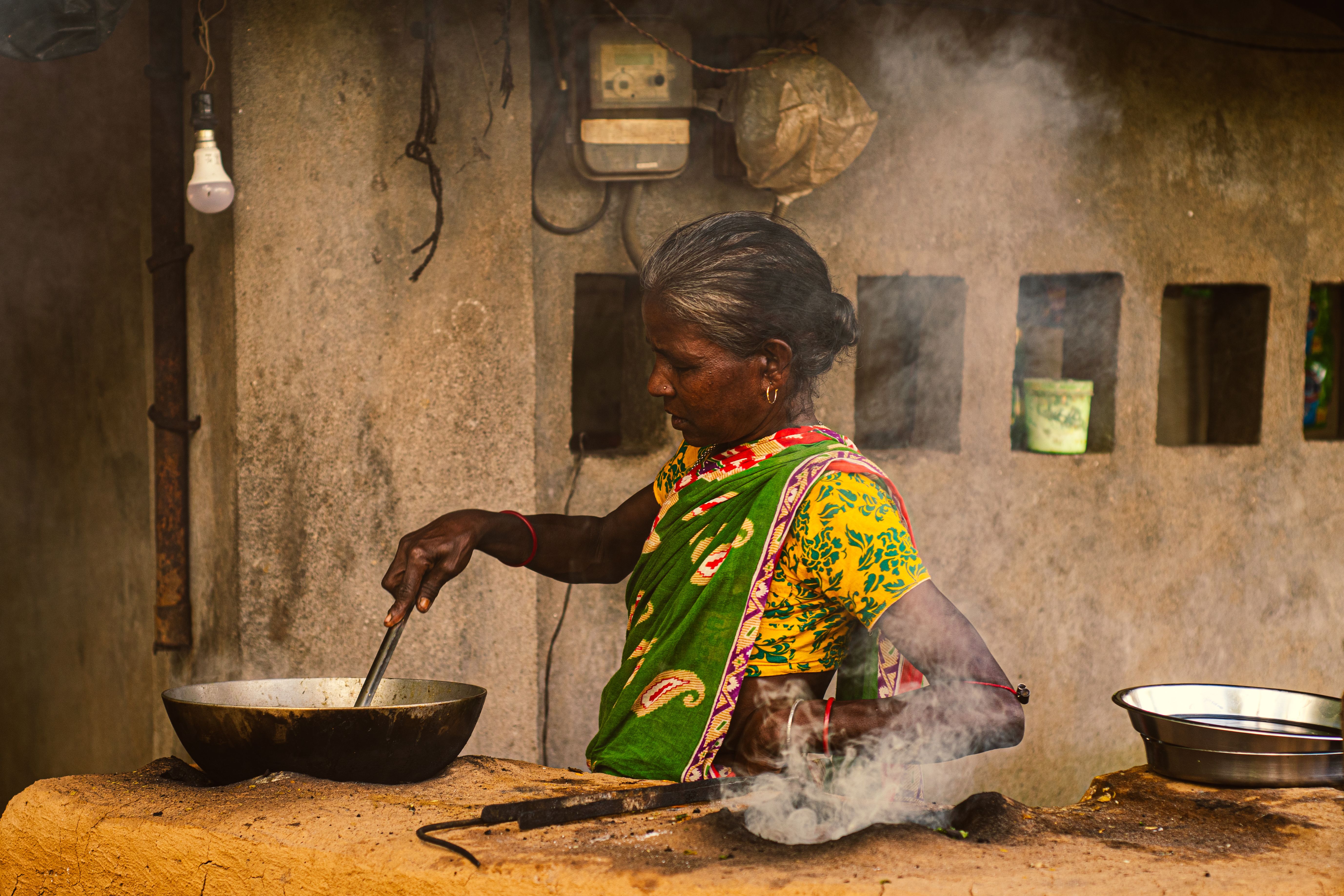 Traditional Cooking in Rustic Indian Setting · Free Stock Photo