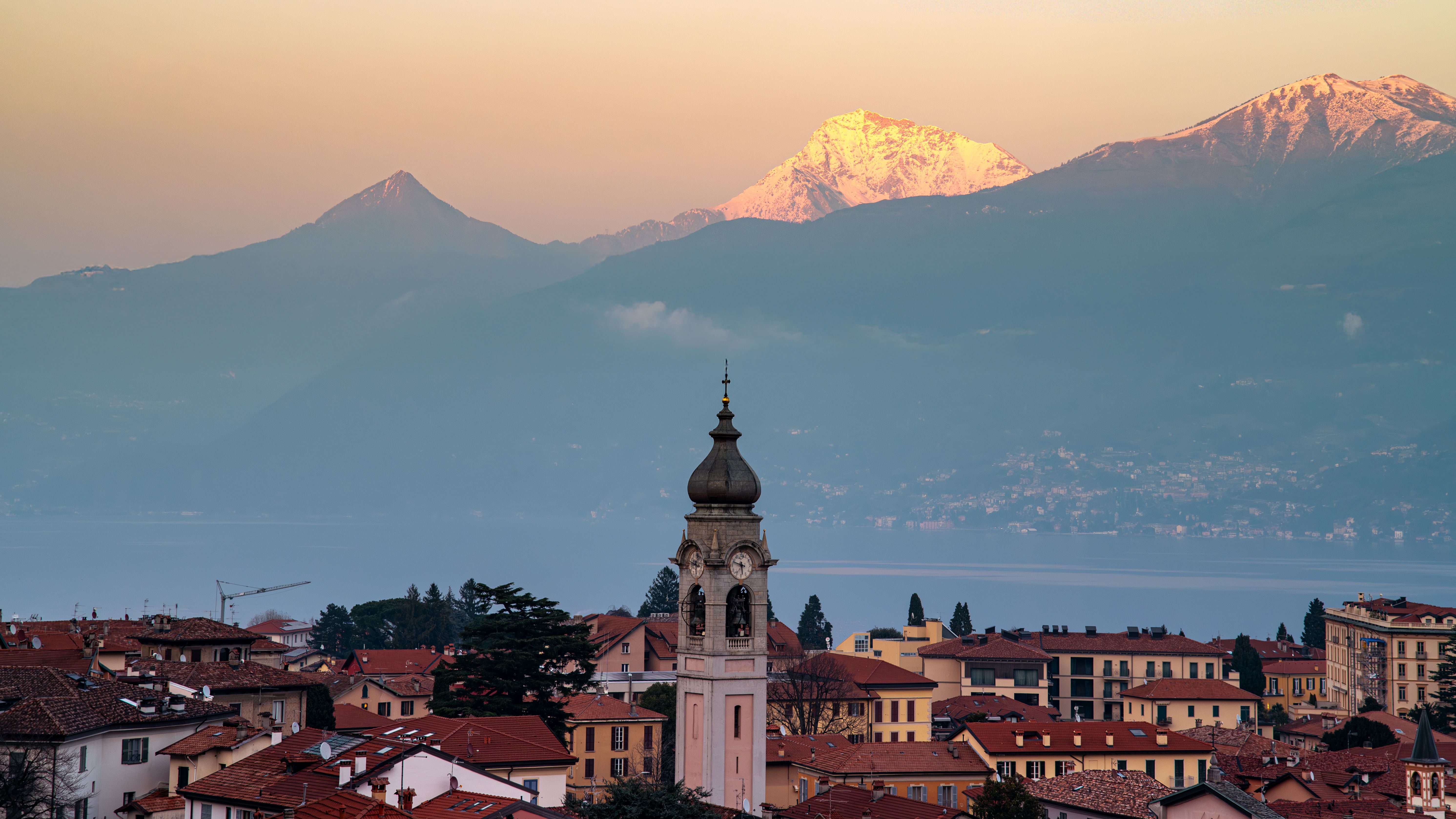 Scenic View of Italian Village and Alps at Sunset · Free Stock Photo