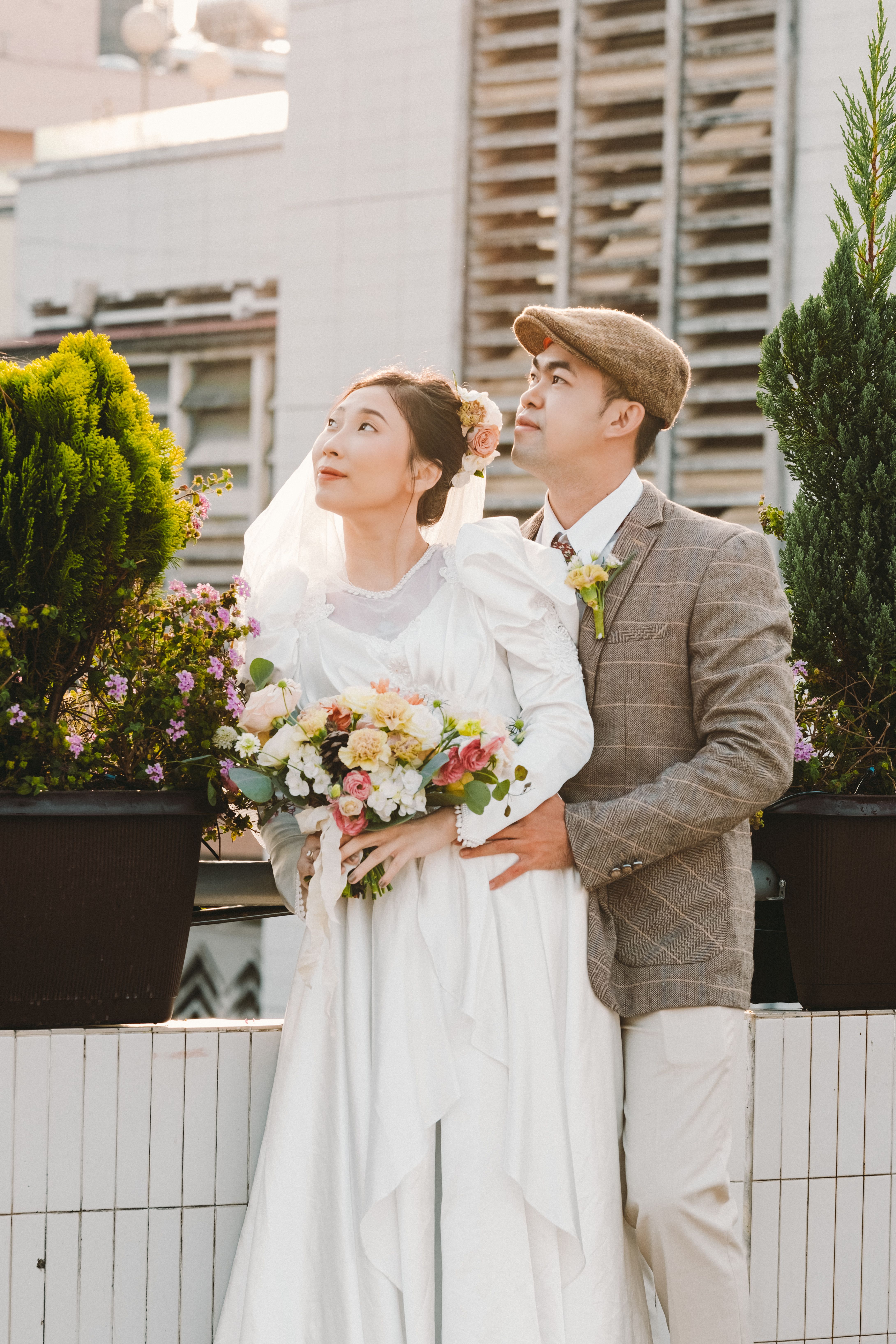 Romantic Outdoor Wedding Portrait on Rooftop · Free Stock Photo