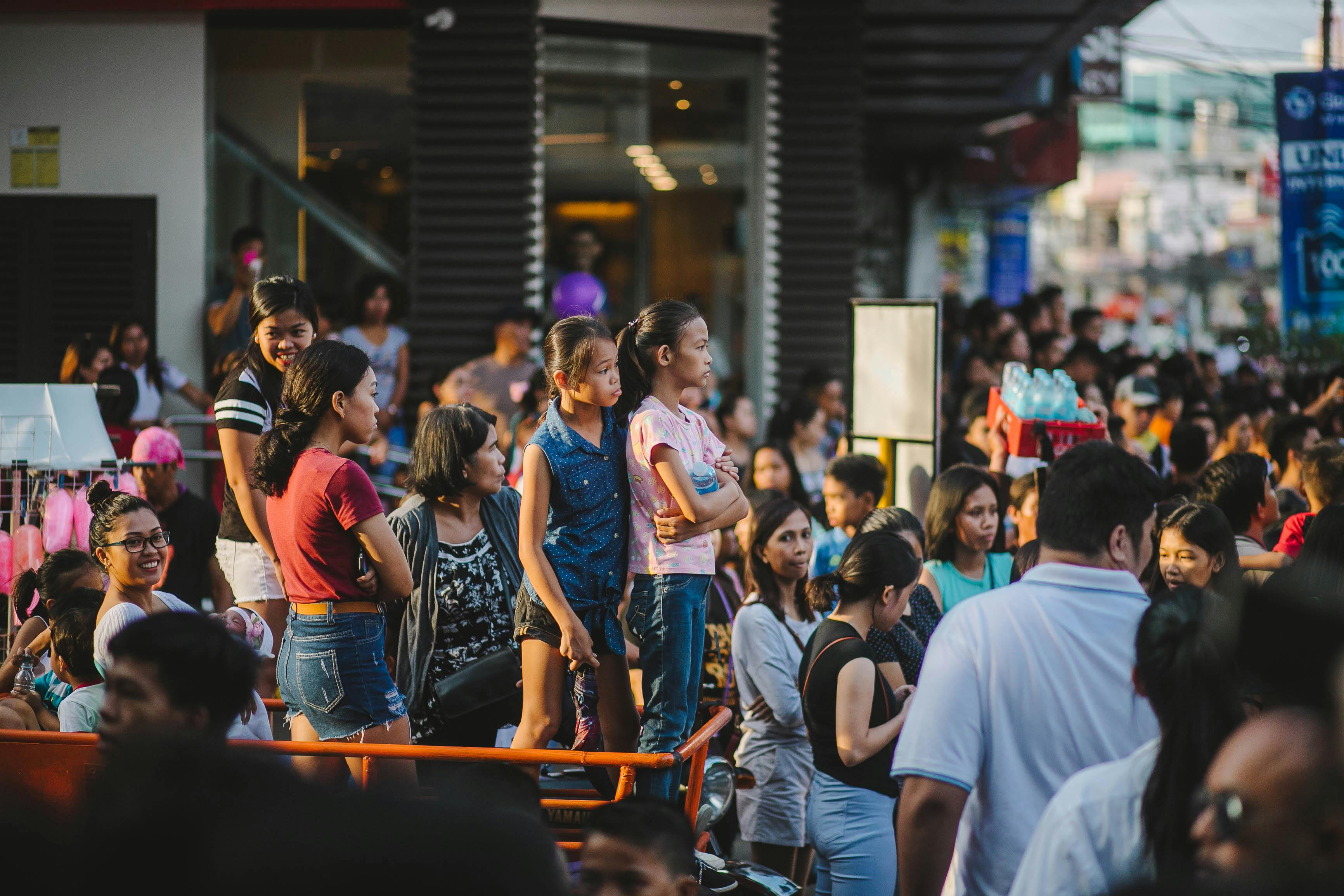 People Standing Outside Buildings · Free Stock Photo