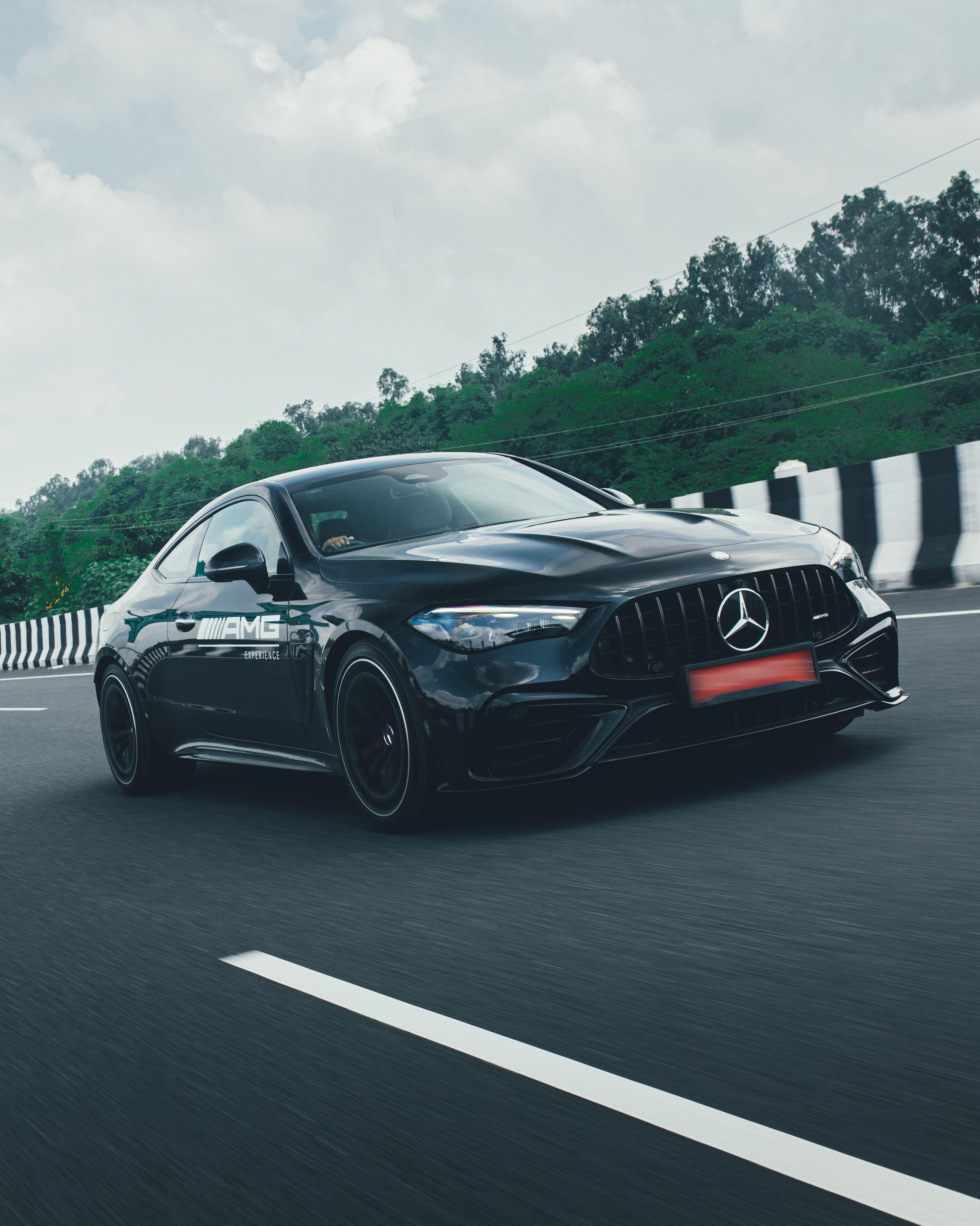 Luxury Black Mercedes-Benz on Open Road in Delhi · Free Stock Photo