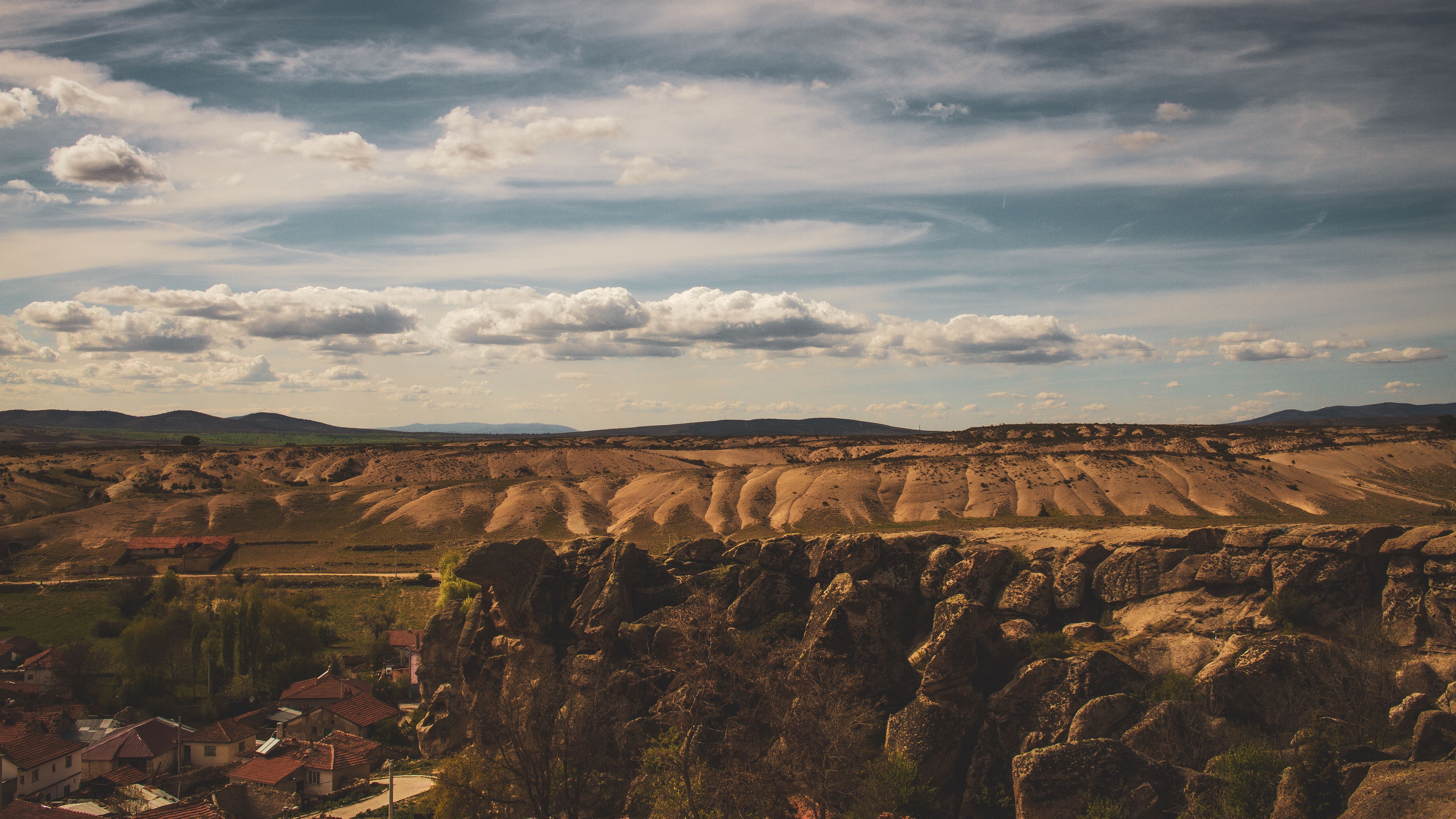 Stunning Landscape with Rocky Terrain and Clear Sky · Free Stock Photo