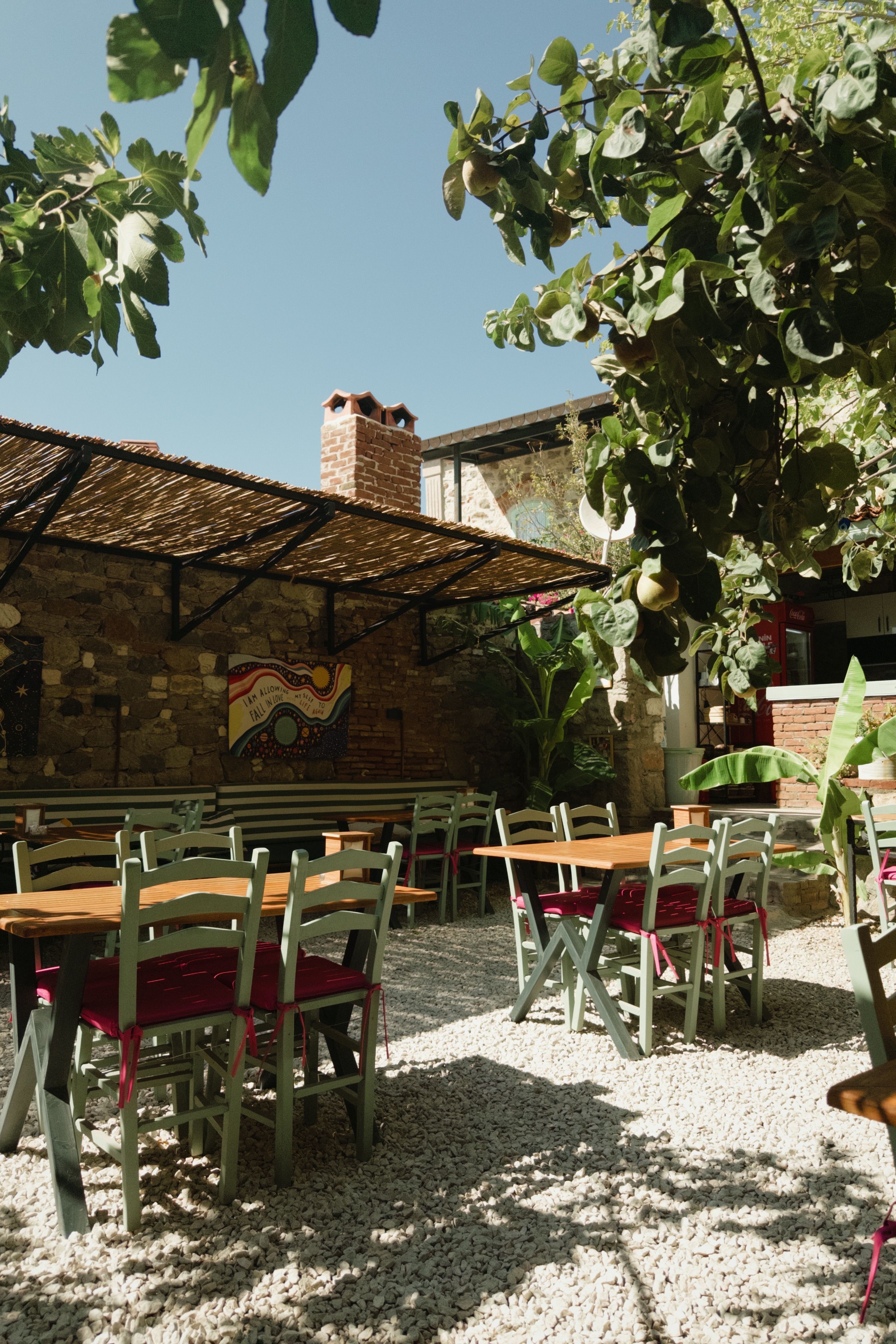 Charming Outdoor Cafe with Rustic Design · Free Stock Photo