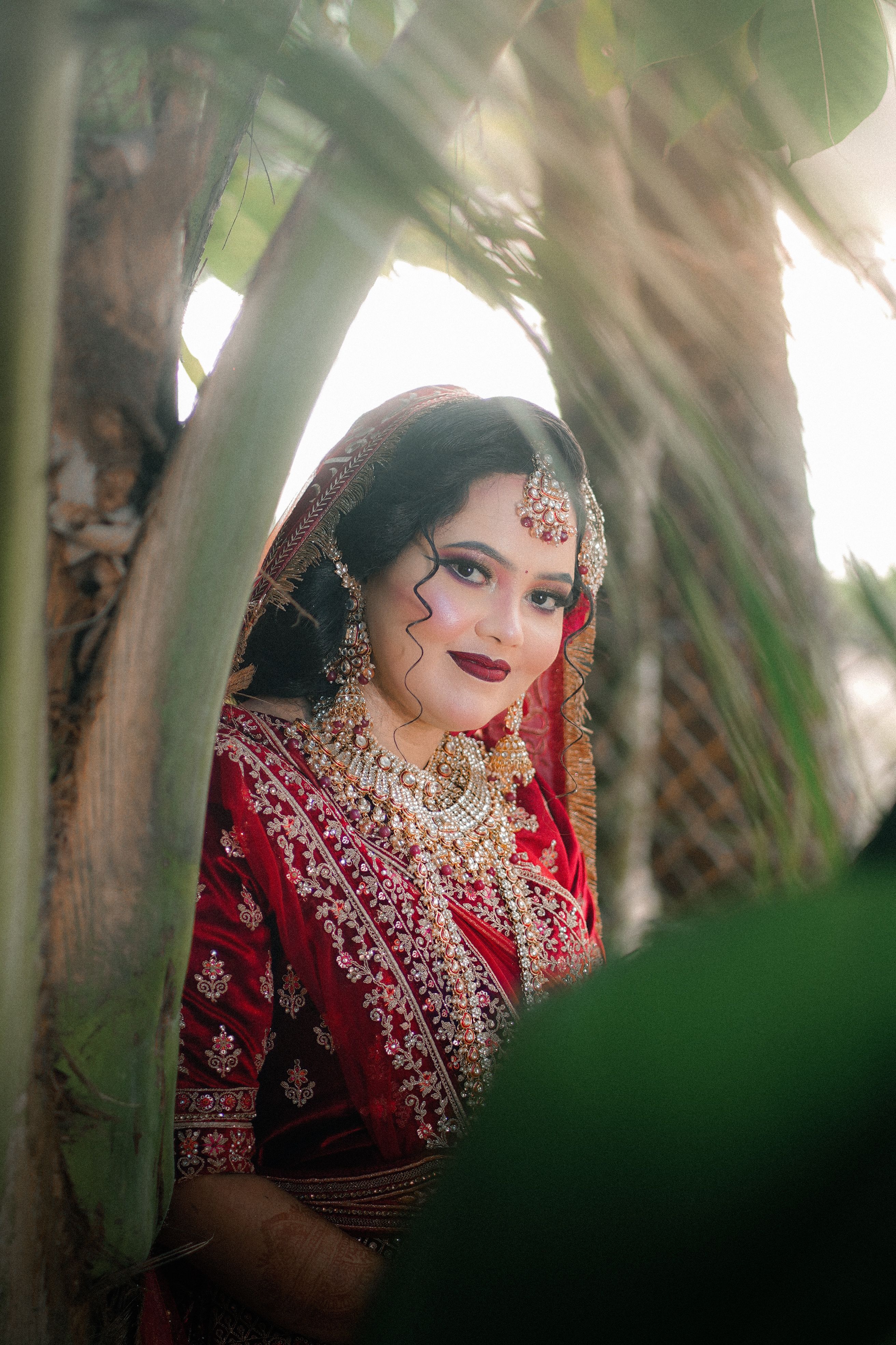 Elegant Bride in Traditional Red Wedding Attire · Free Stock Photo