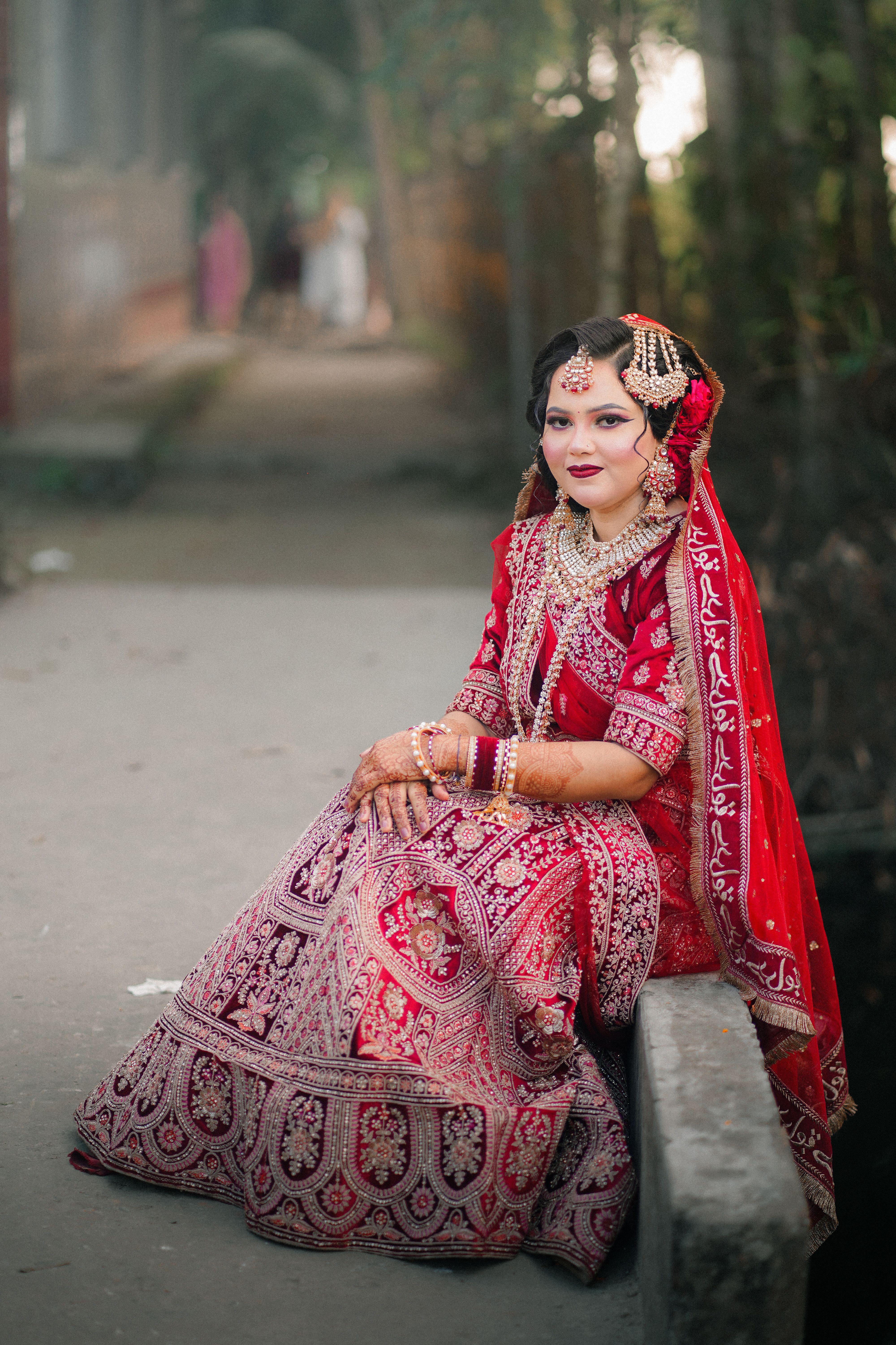 Elegant Bride in Traditional Red Wedding Attire · Free Stock Photo