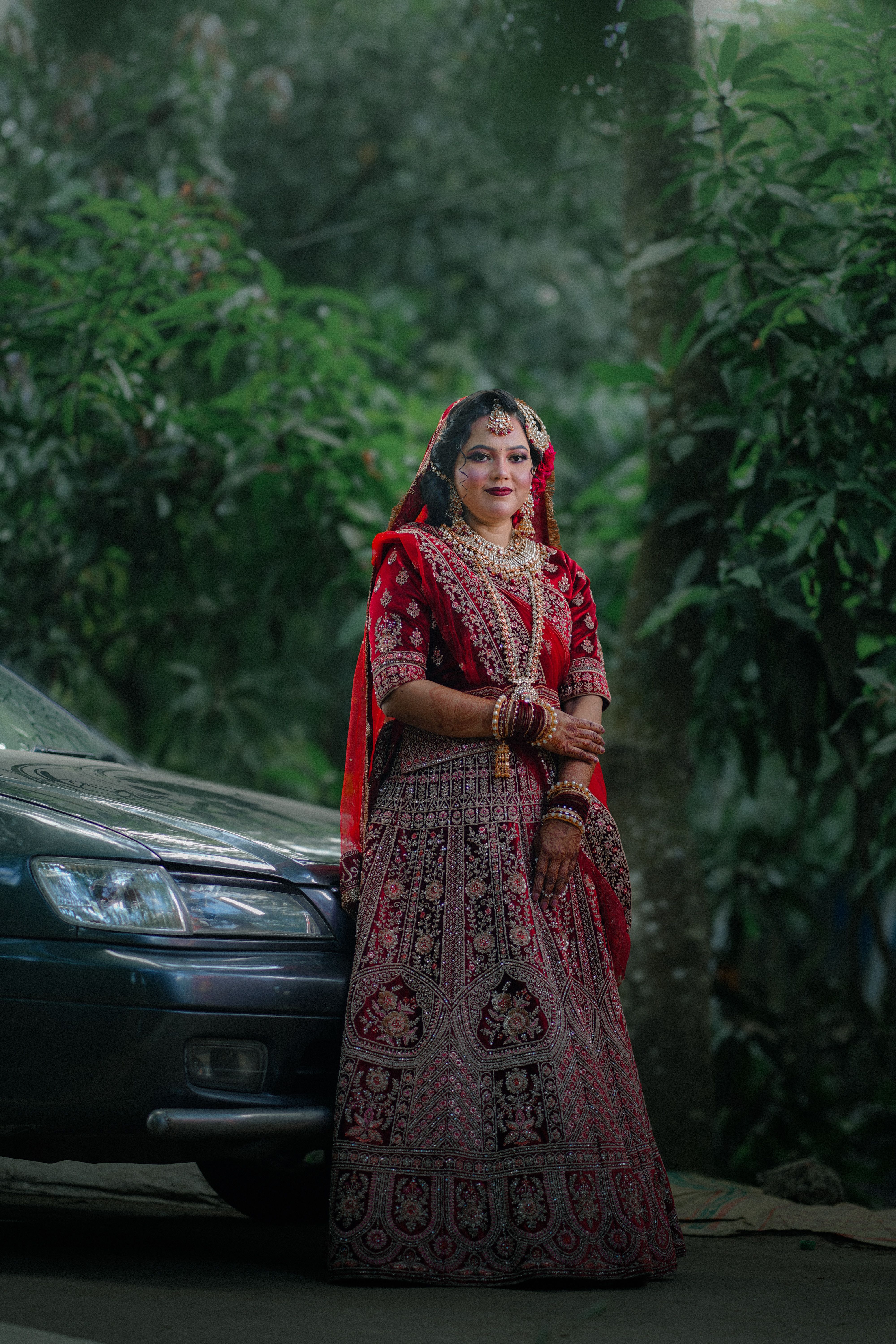 Traditional Bride in Ornate Wedding Attire Outdoors · Free Stock Photo