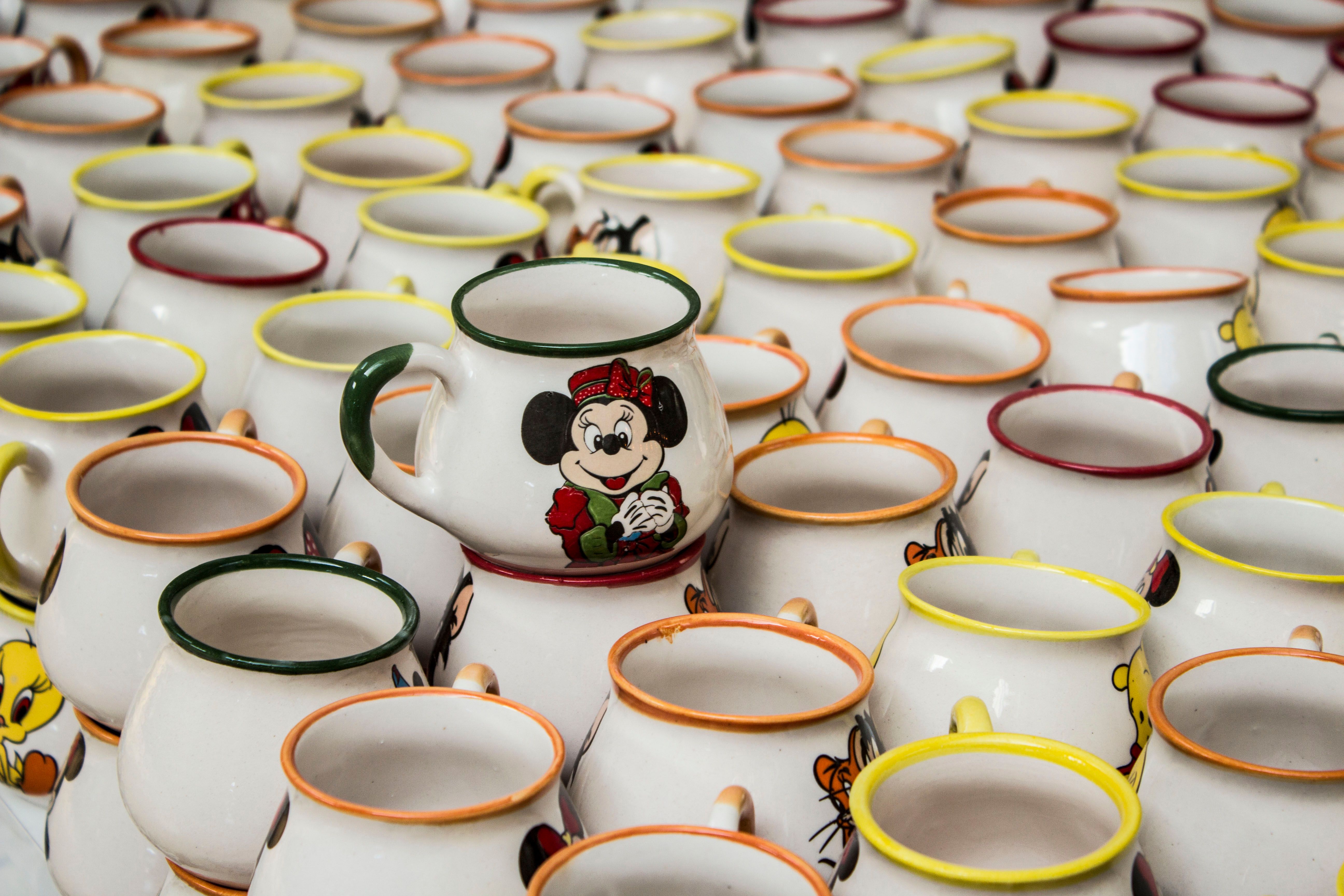 Colorful Ceramic Mugs with Cartoon Characters · Free Stock Photo