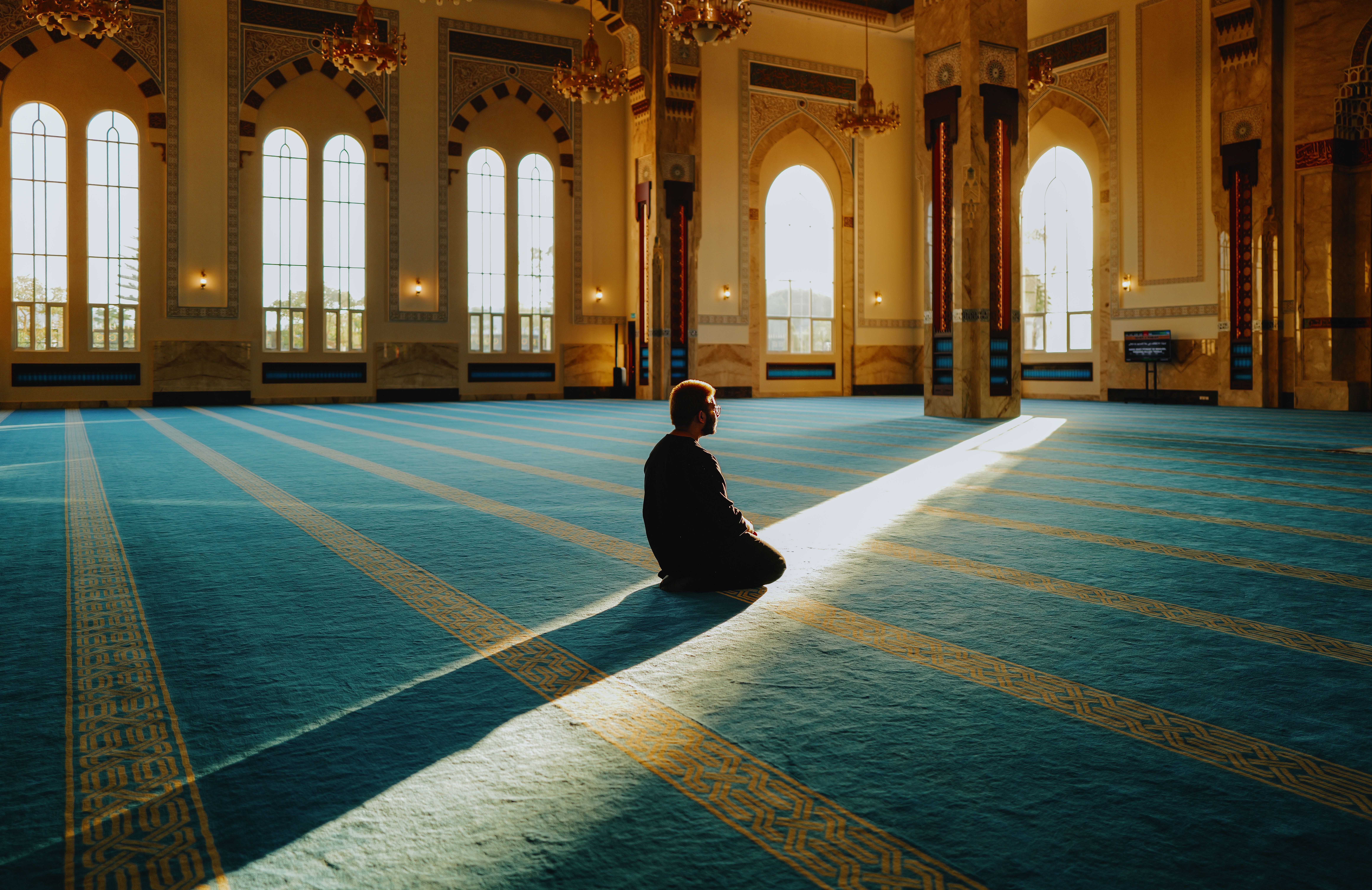 Man Praying in Mosque · Free Stock Photo