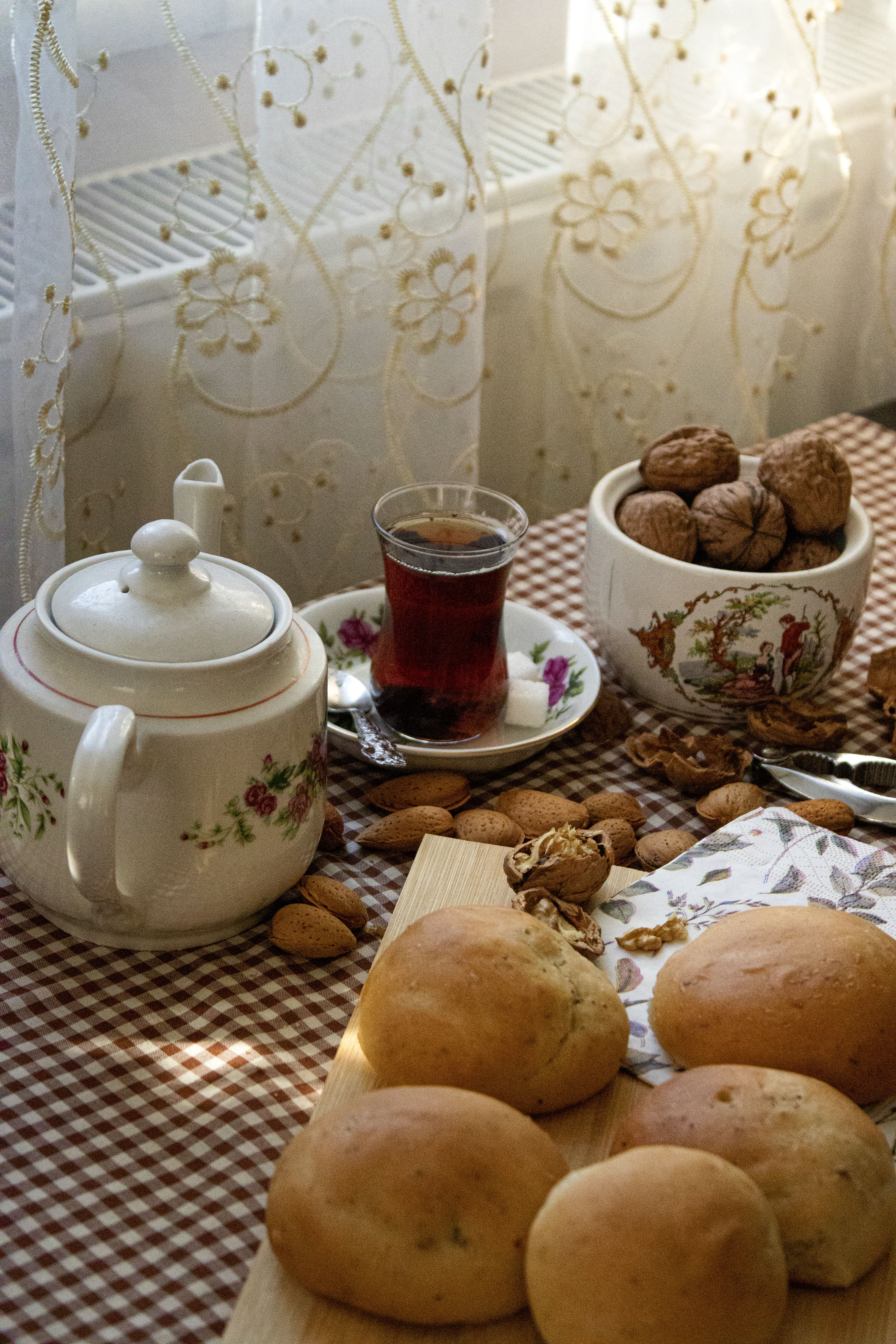 Cozy Afternoon Tea Setup with Teapot and Pastries · Free Stock Photo