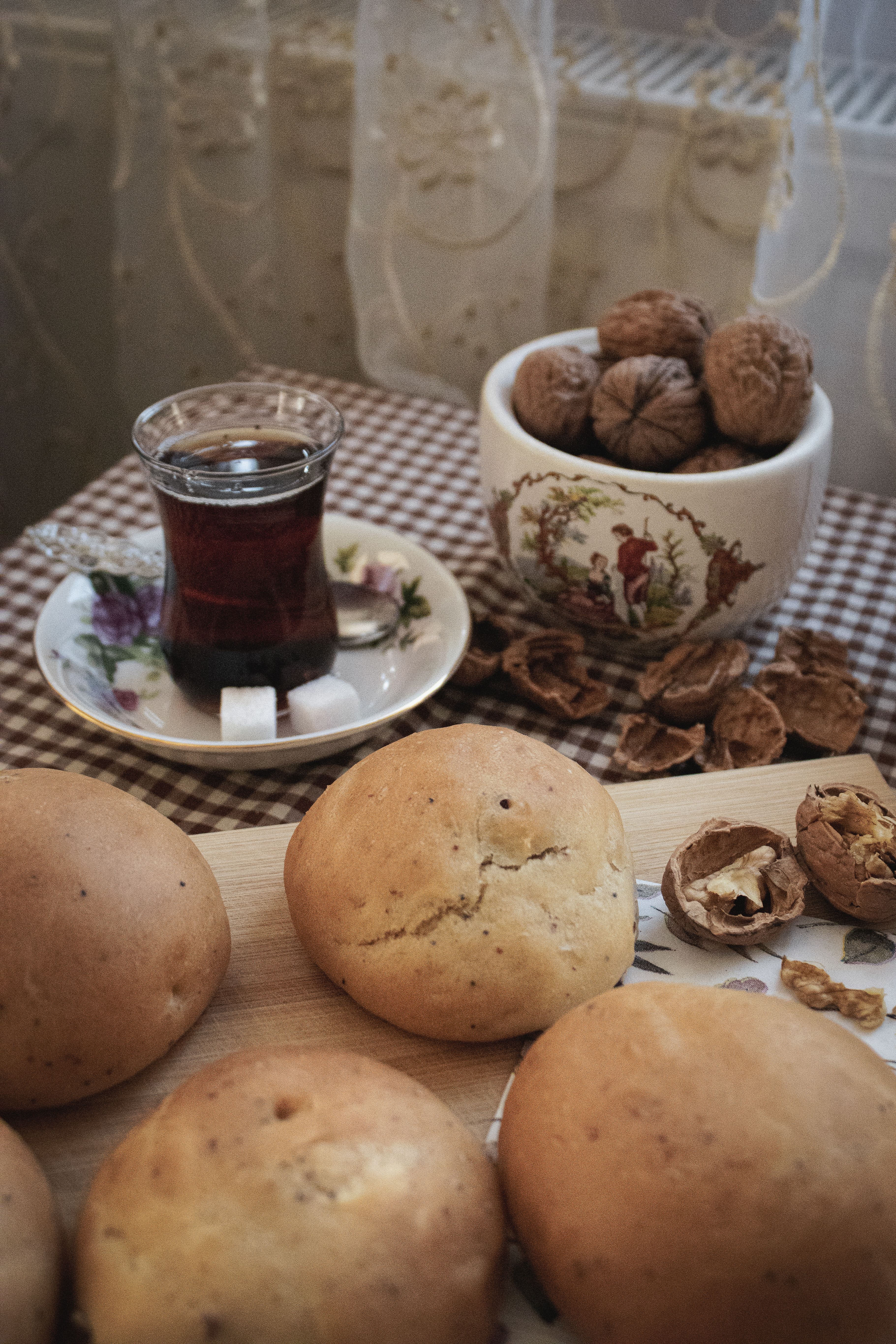 Cozy Tea and Pastries with Walnuts Setup · Free Stock Photo