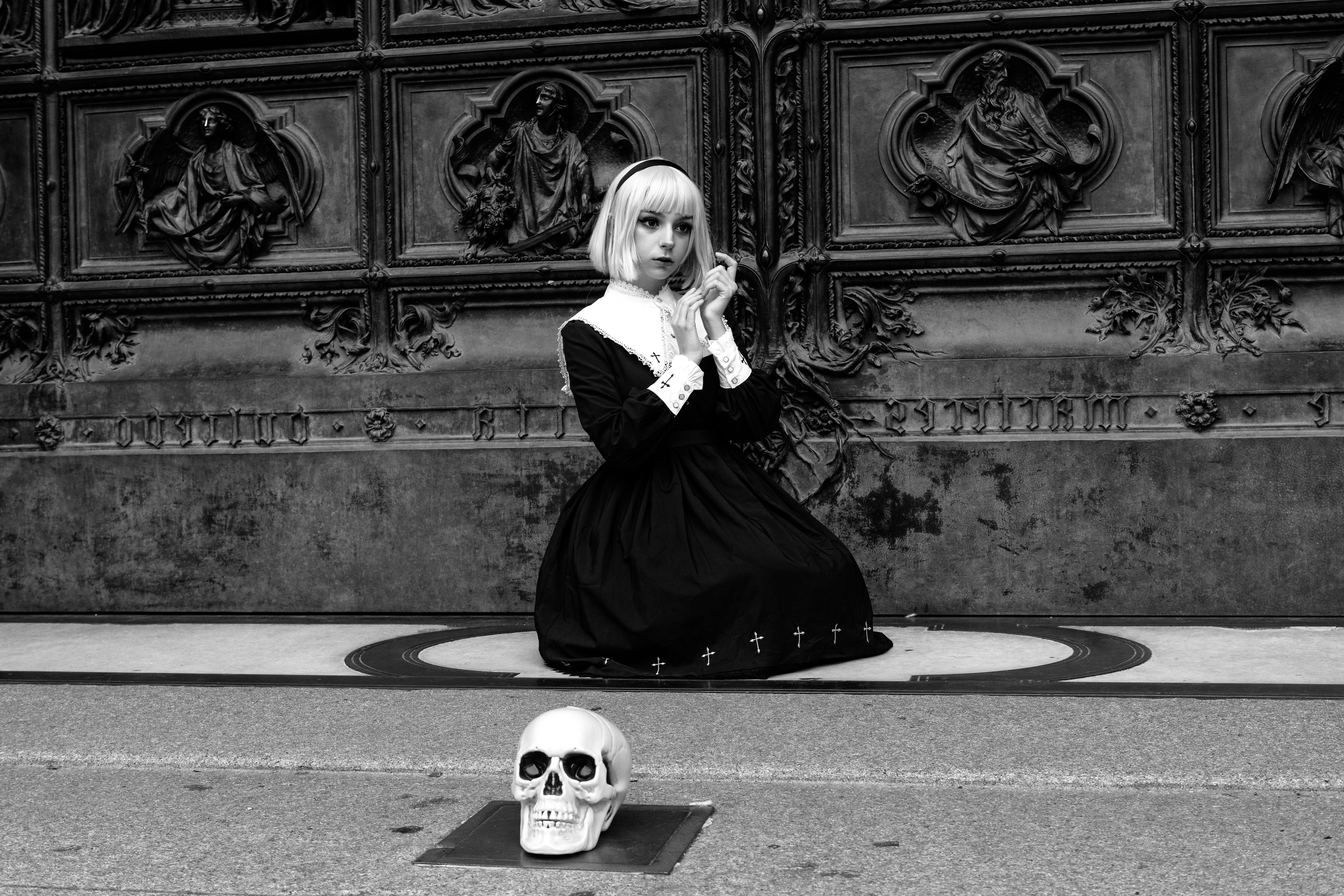 Gothic Woman Kneeling in Black and White Scene · Free Stock Photo