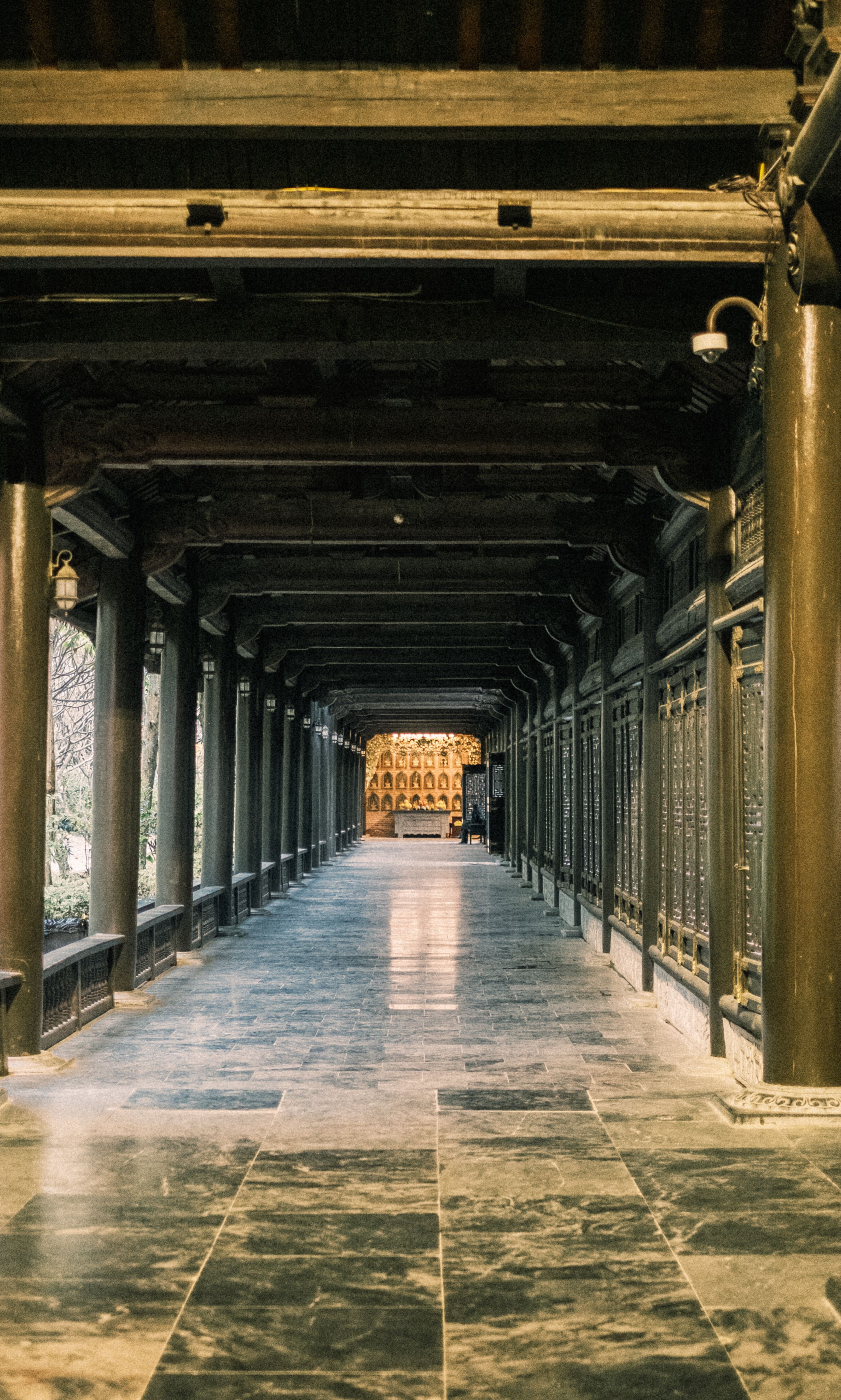 Ancient Wooden Corridor with Intricate Details · Free Stock Photo