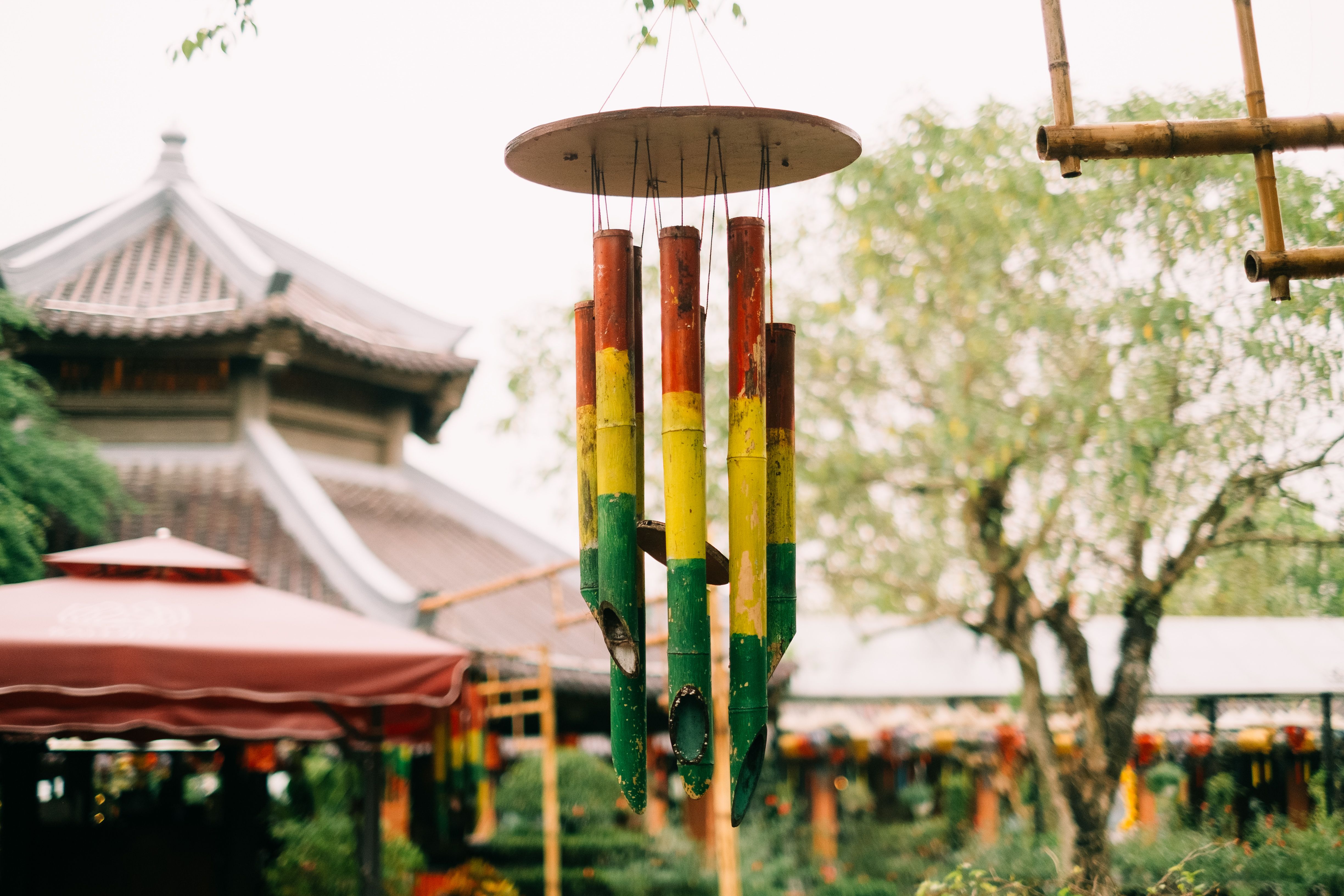Colorful Bamboo Wind Chimes in Asian Garden · Free Stock Photo