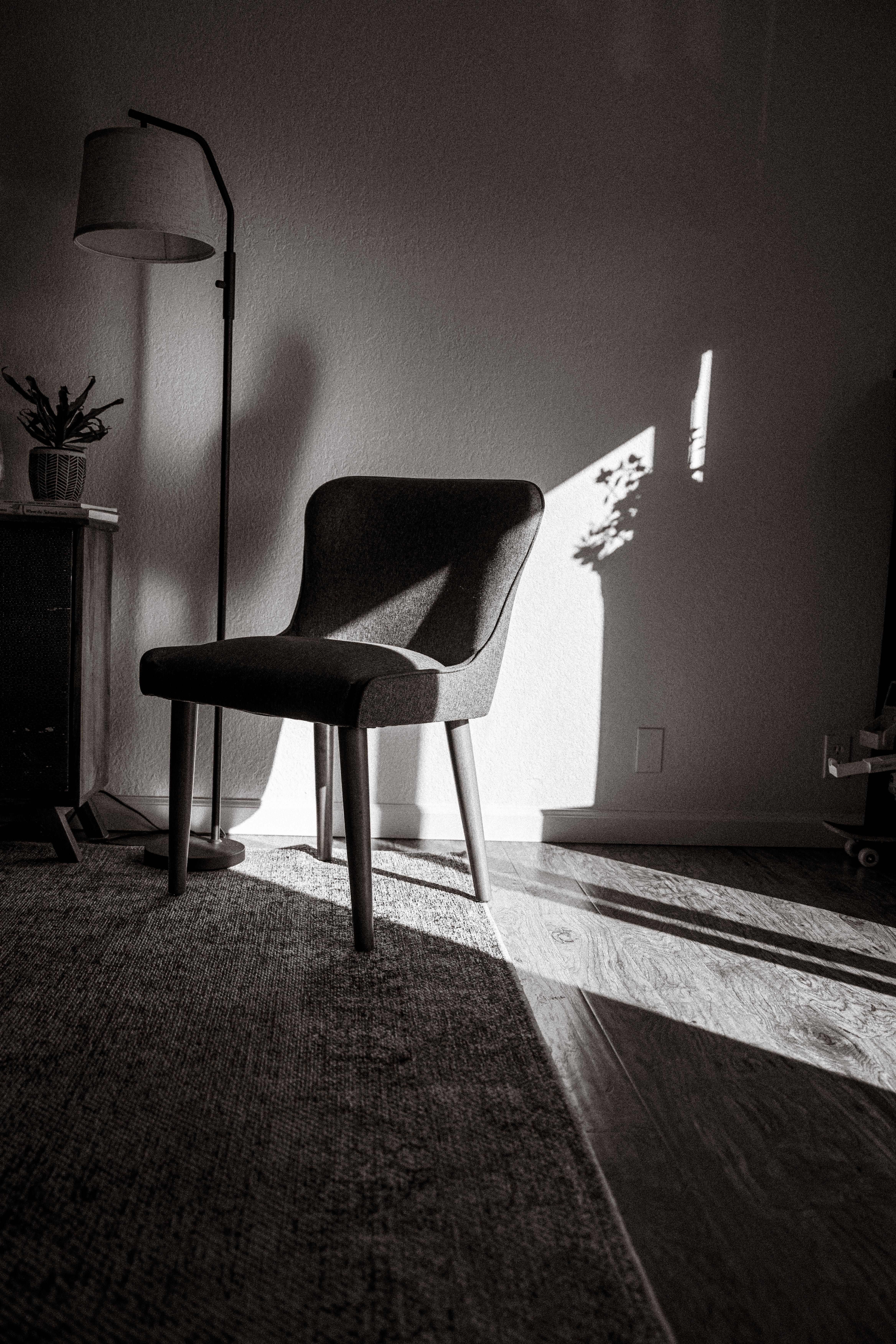 Elegant Minimalist Chair with Shadows in Room · Free Stock Photo
