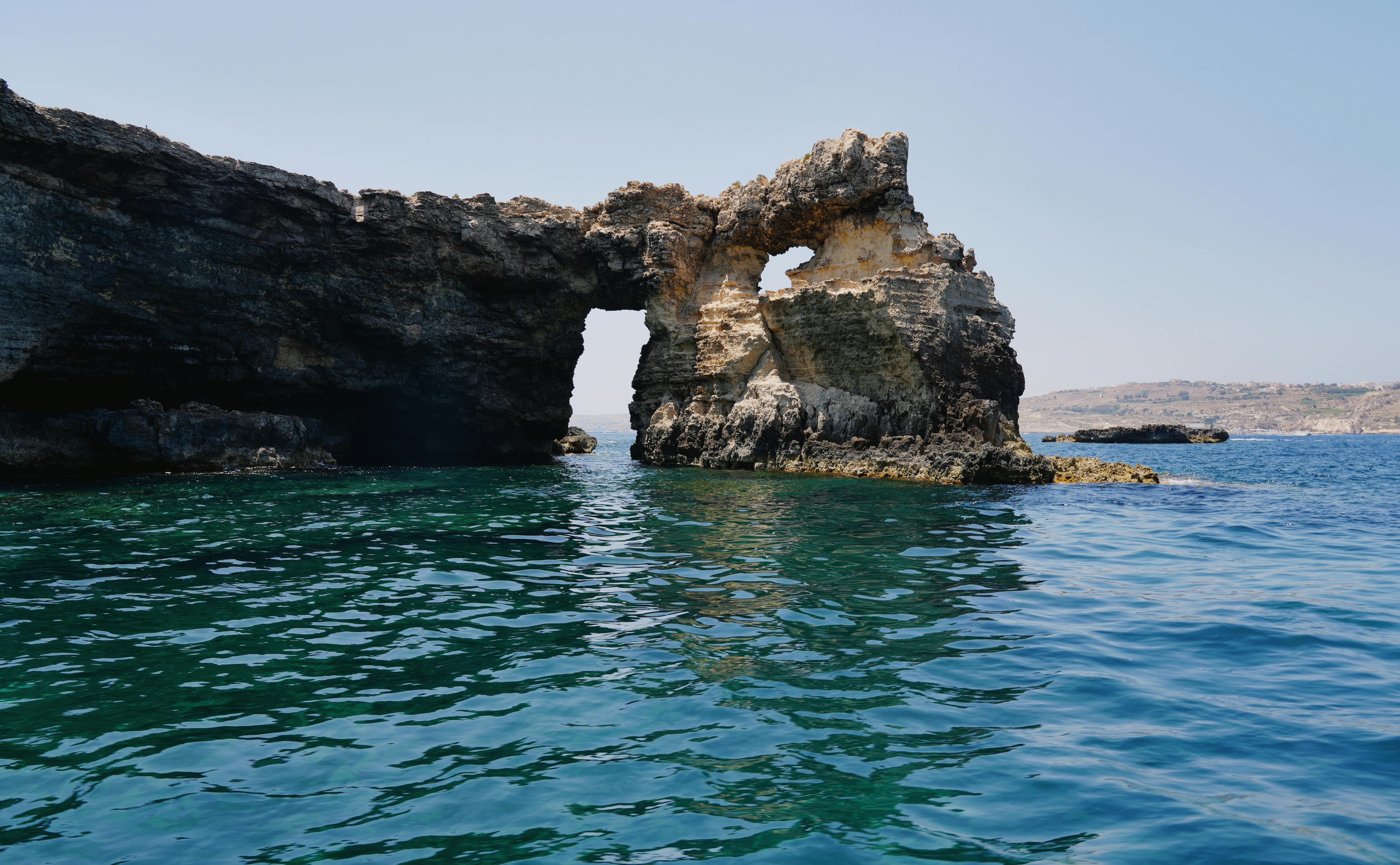 Stunning Rock Formation on Malta's Coastline · Free Stock Photo
