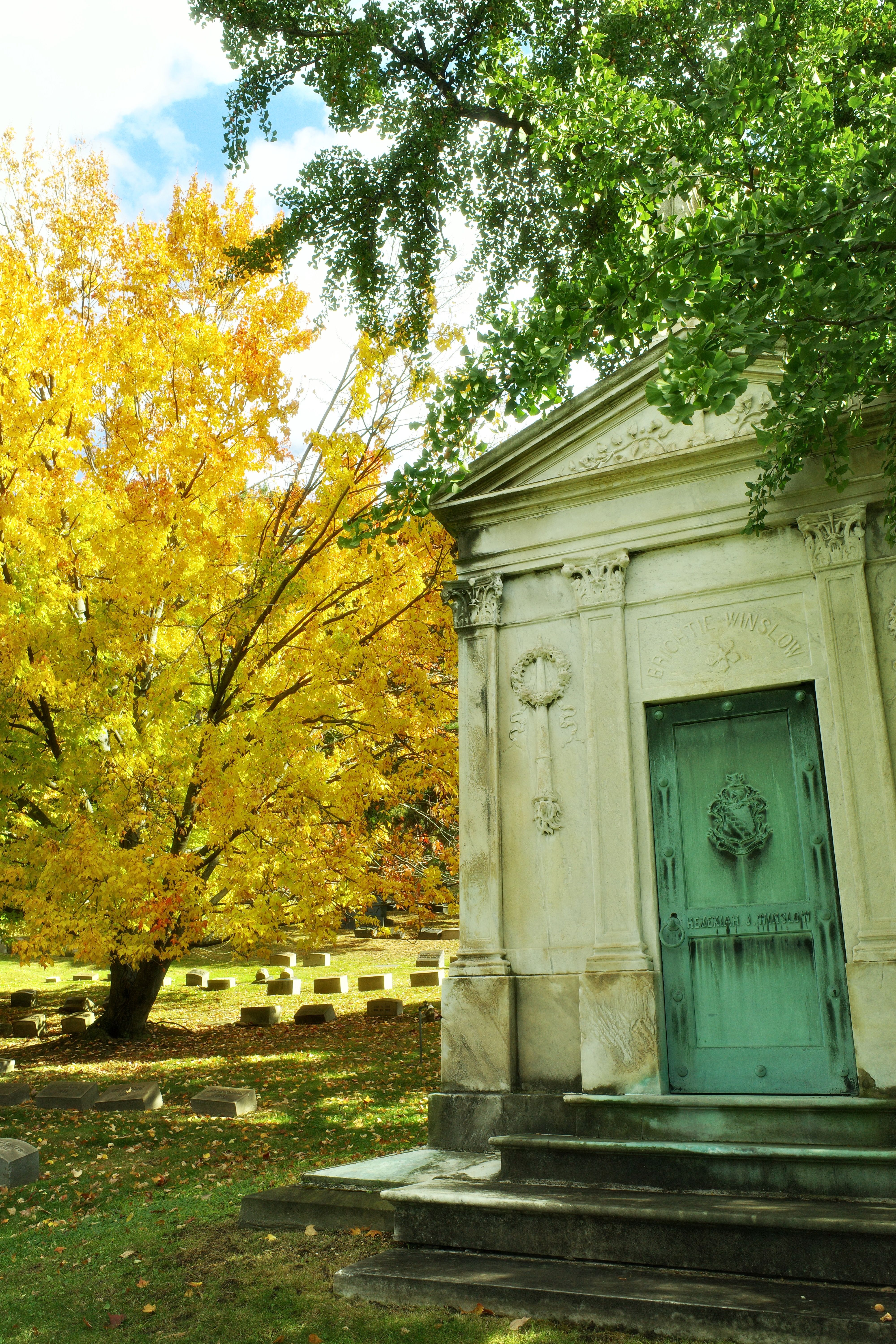 Autumn Cemetery Scene with Yellow Foliage · Free Stock Photo