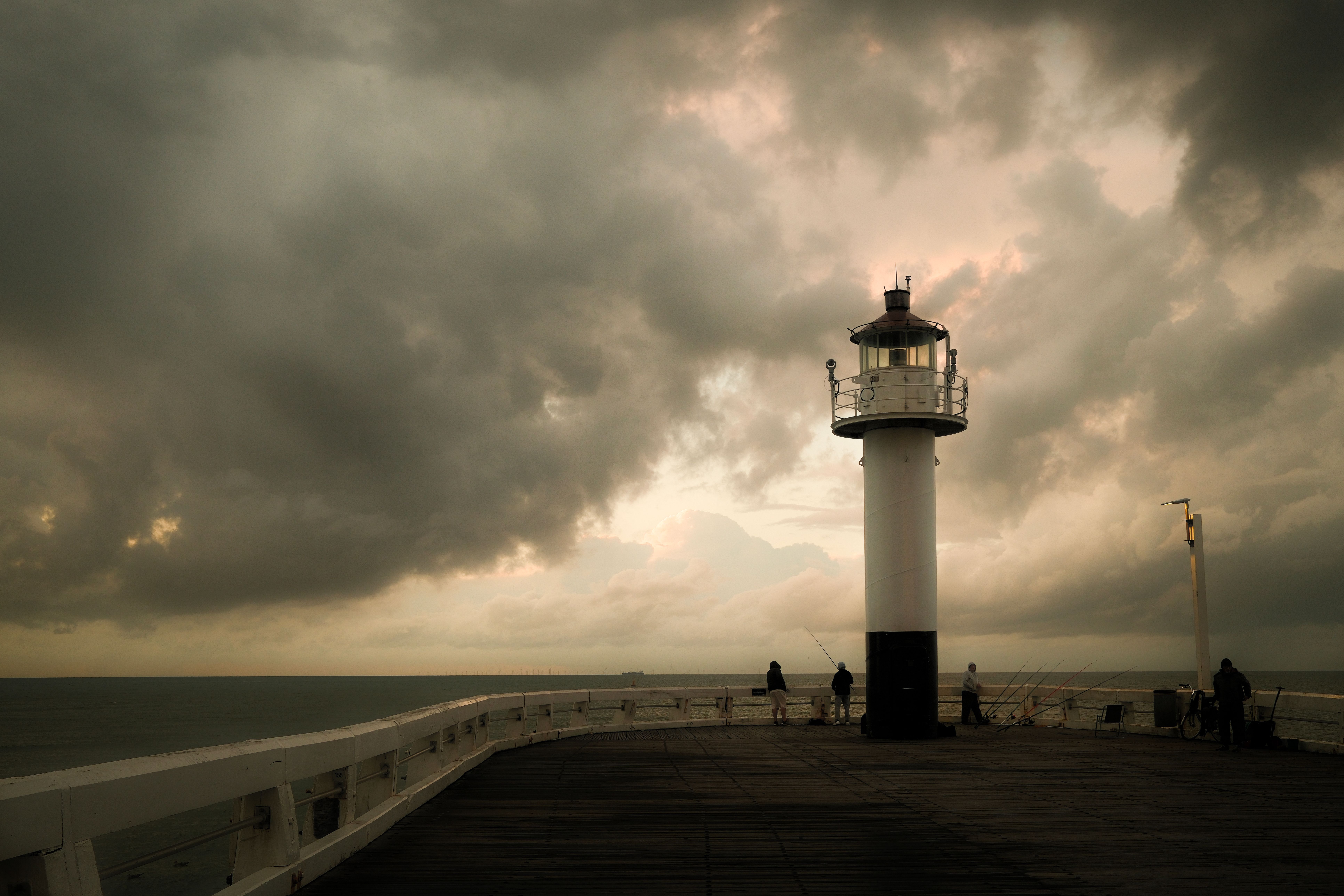 Dramatic Lighthouse Under Stormy Sky · Free Stock Photo