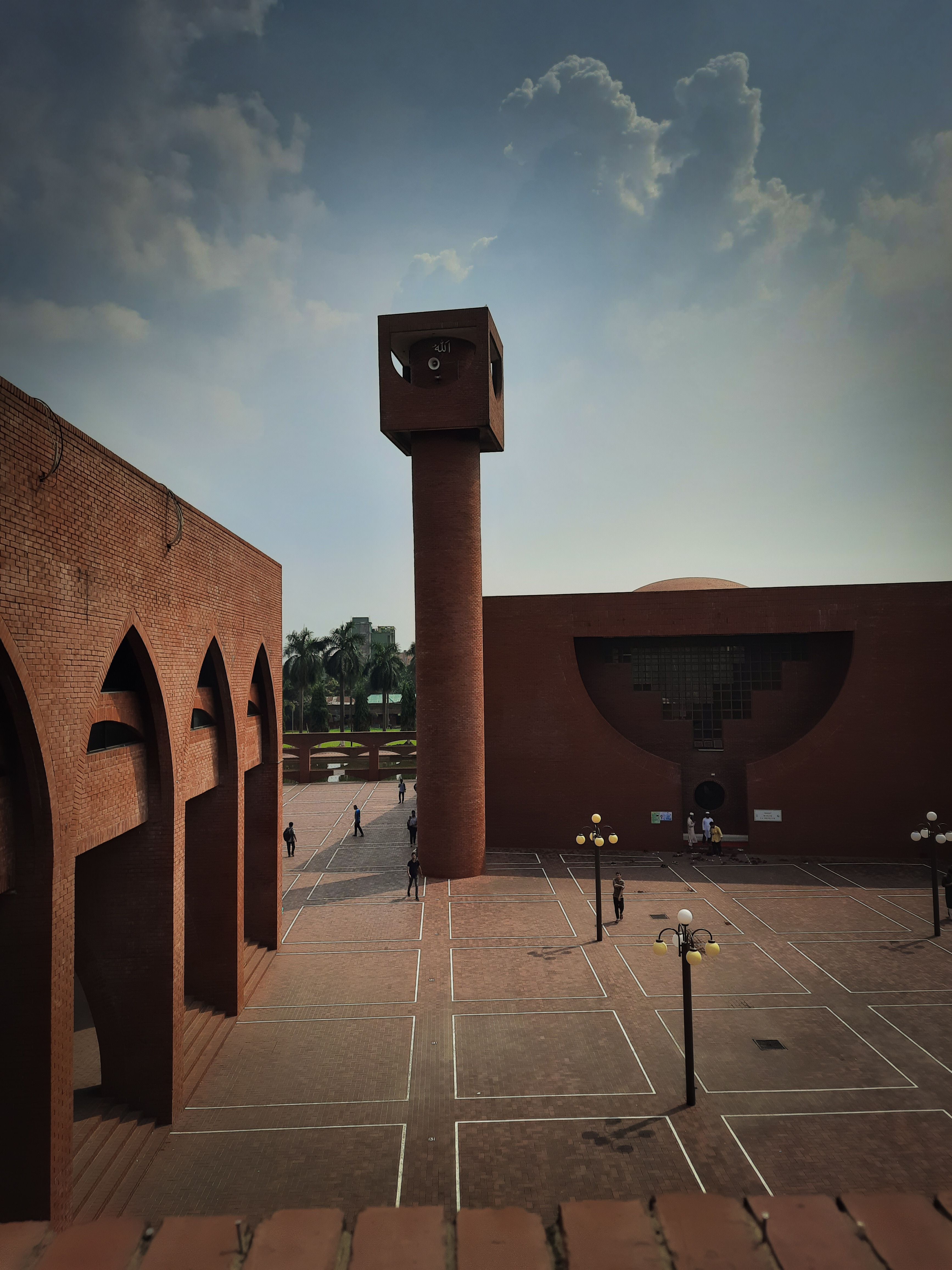 Iconic Brick Architecture in Modern Urban Setting · Free Stock Photo