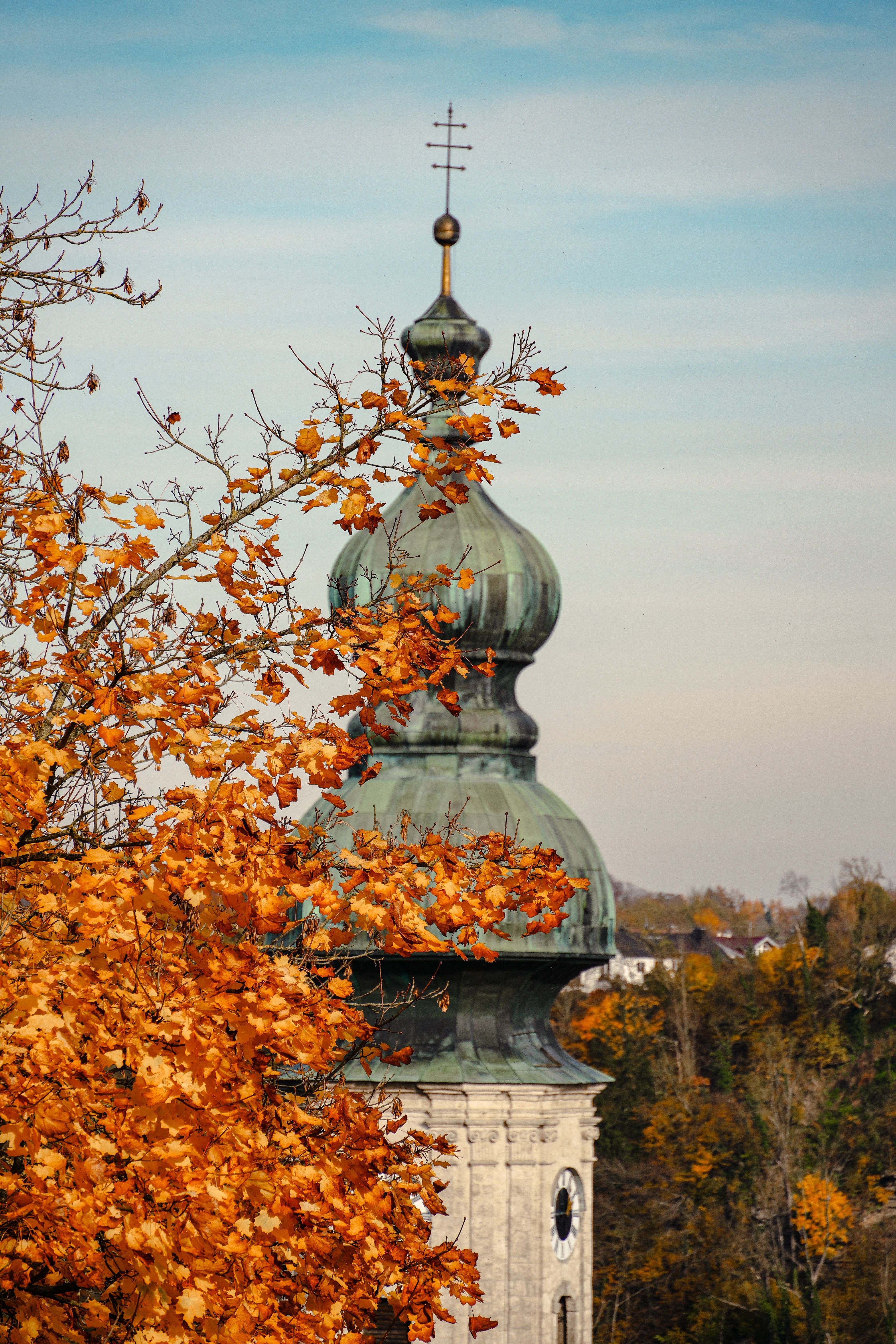 Autumn Scene with Church Tower and Fall Foliage · Free Stock Photo