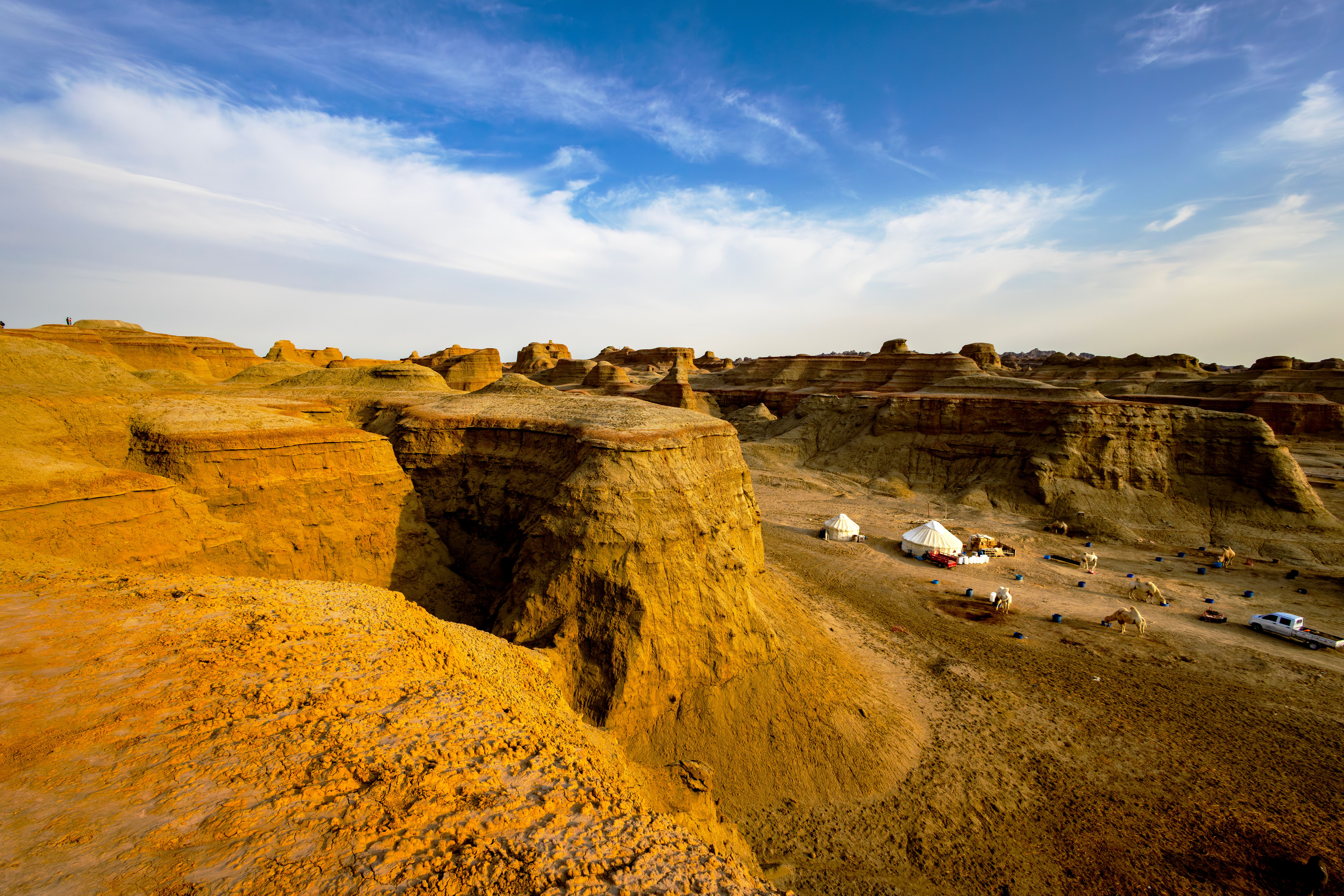 Stunning desert landscape with yurts and blue sky · Free Stock Photo