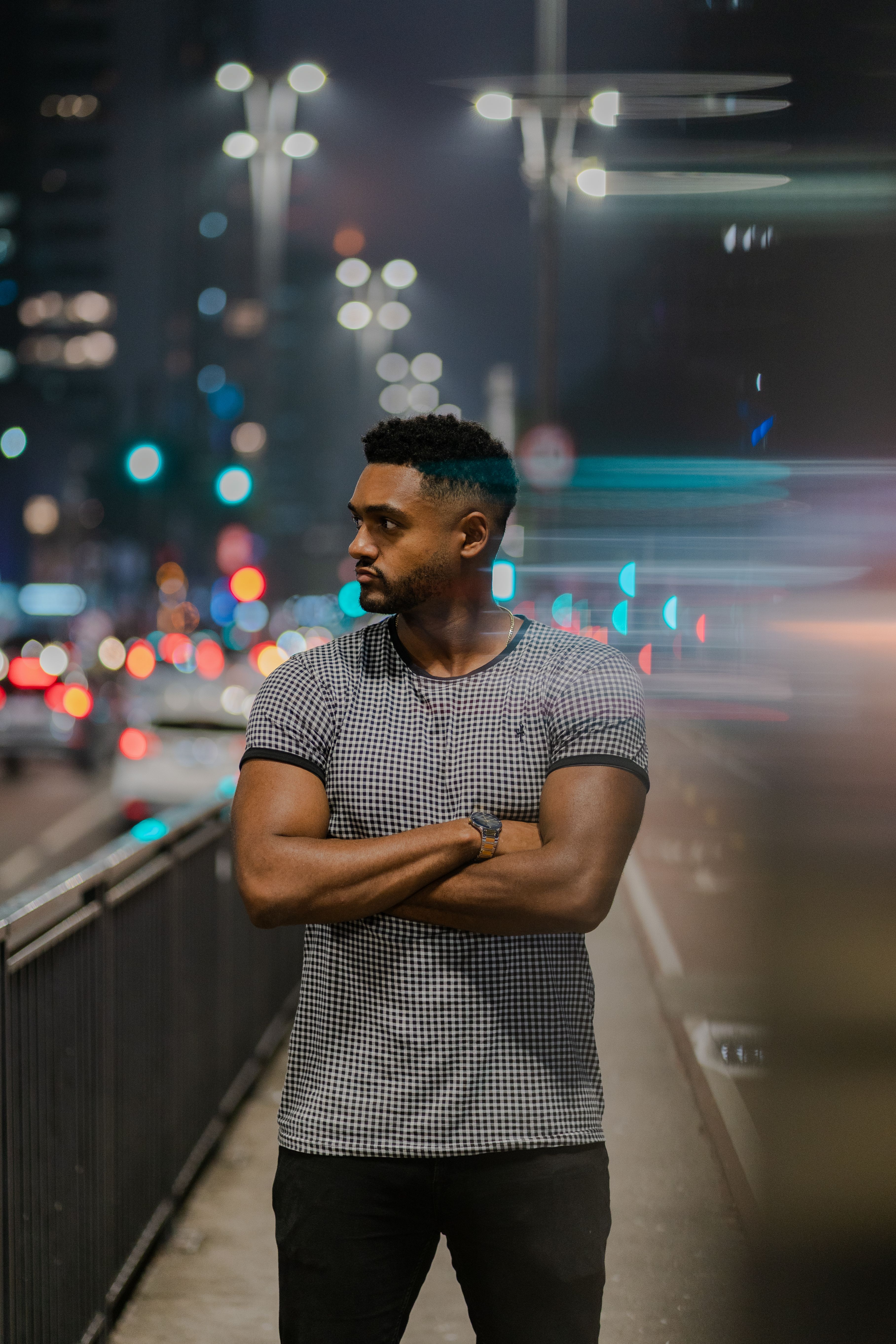 Stylish Man Standing in a Vibrant City Night · Free Stock Photo