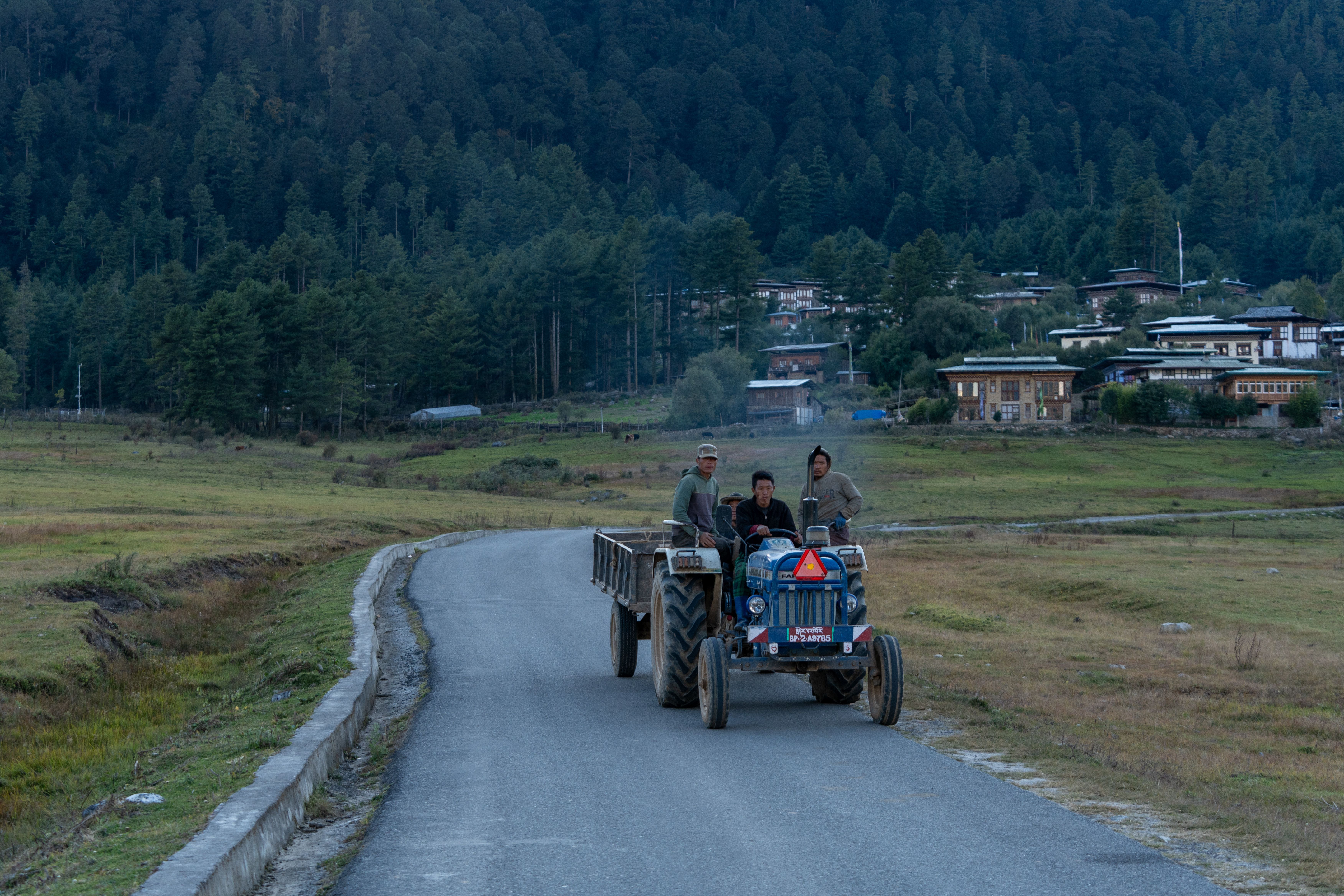 Tractor on Scenic Bhutanese Rural Road · Free Stock Photo