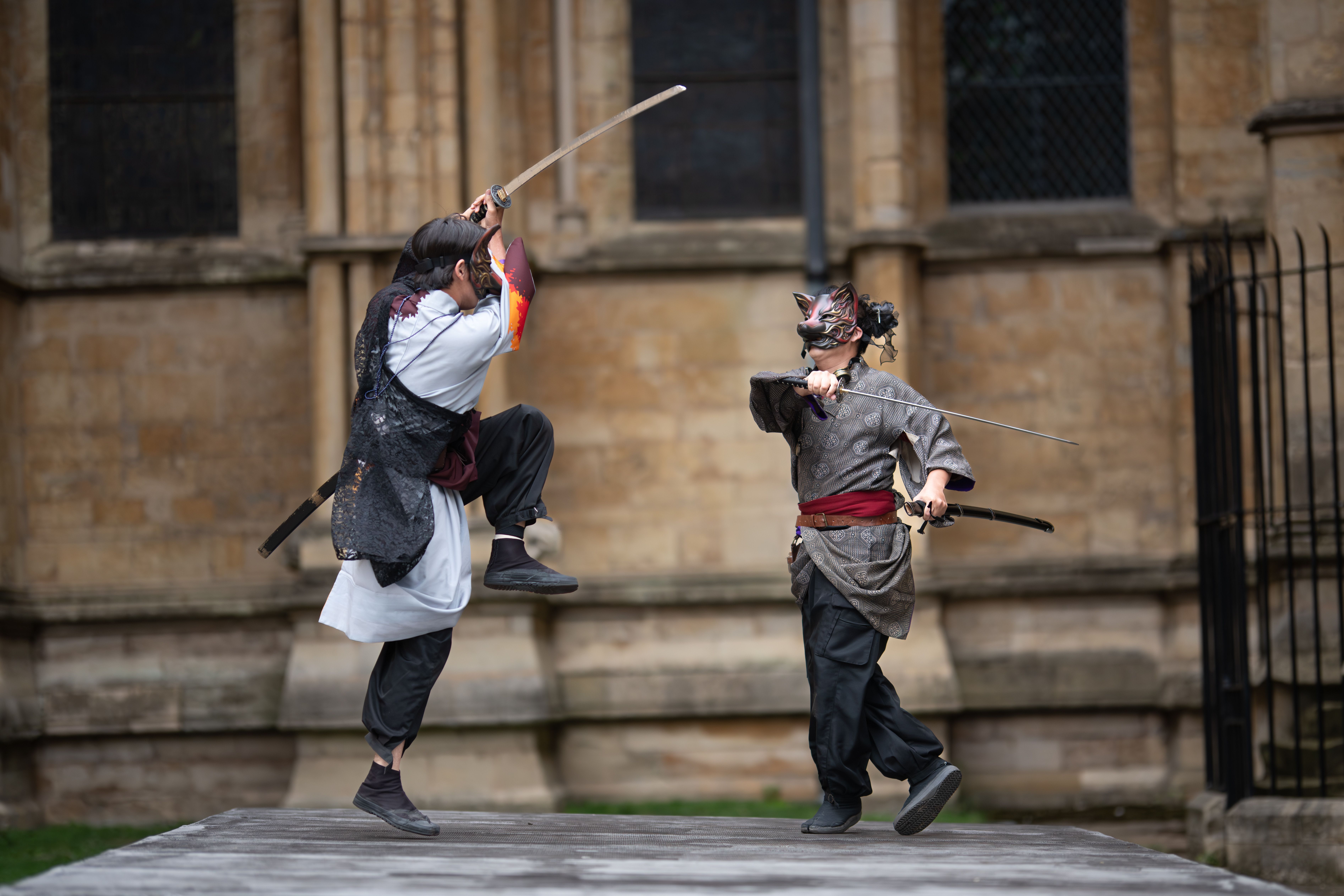 Dynamic Samurai Sword Fight in Traditional Dress · Free Stock Photo