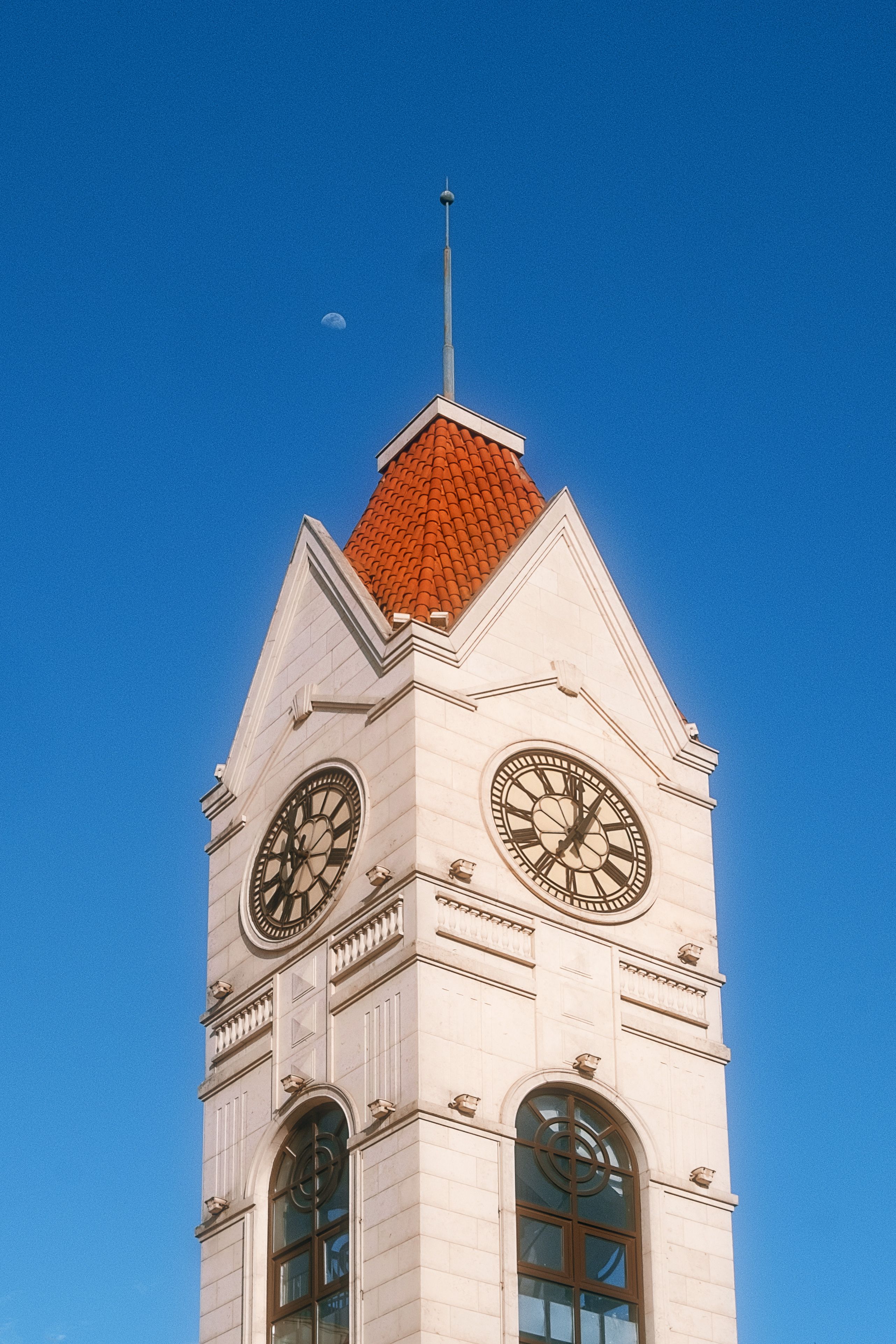 Classic Clock Tower Against Blue Sky · Free Stock Photo