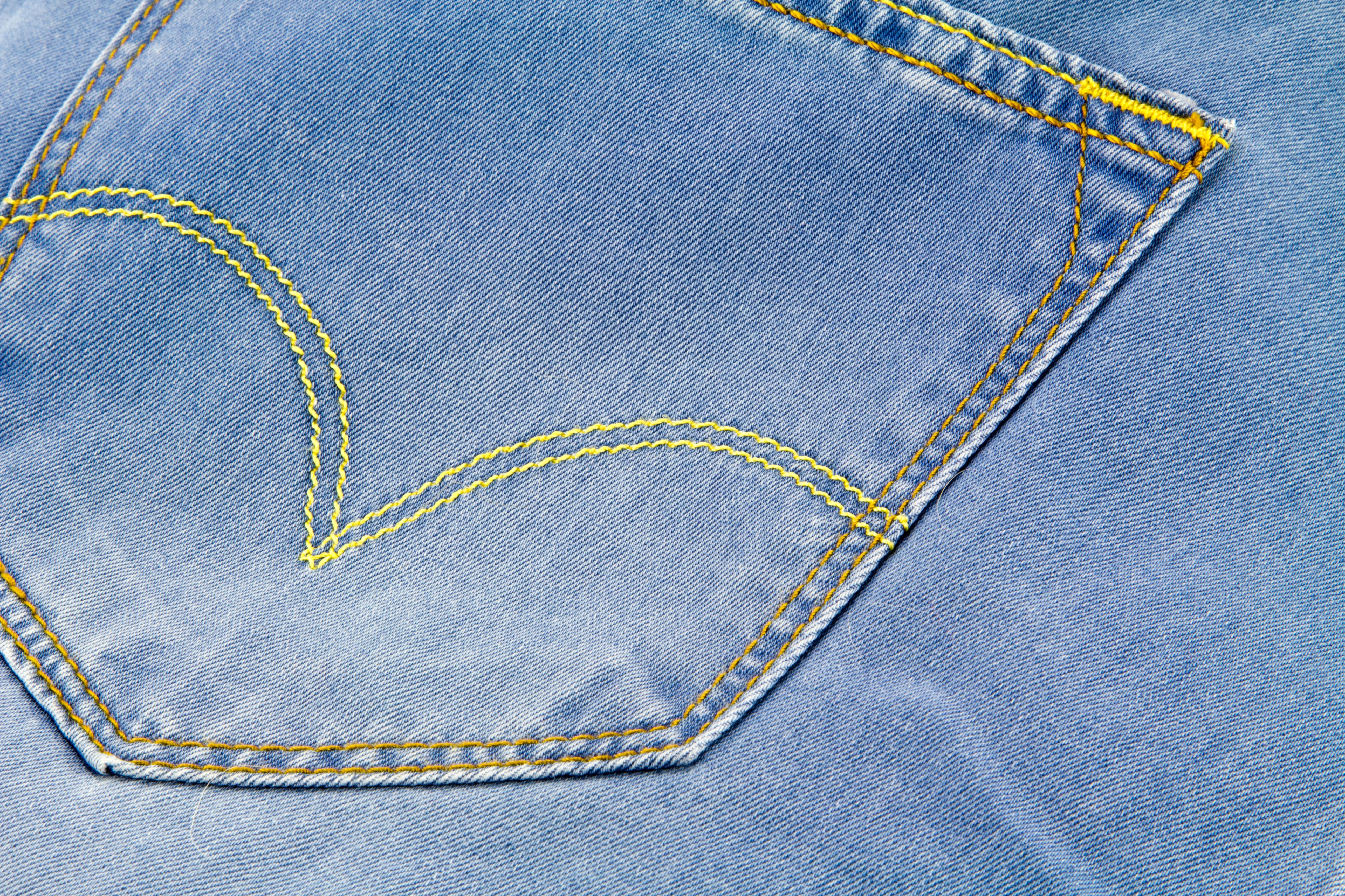 Close-up of Blue Denim Jeans Pocket Stitching · Free Stock Photo